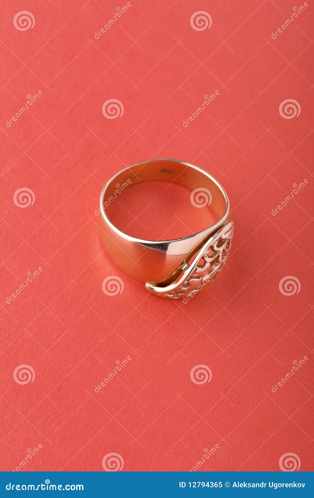 Gold ring on red stock image. Image of gold, adornment - 12794365