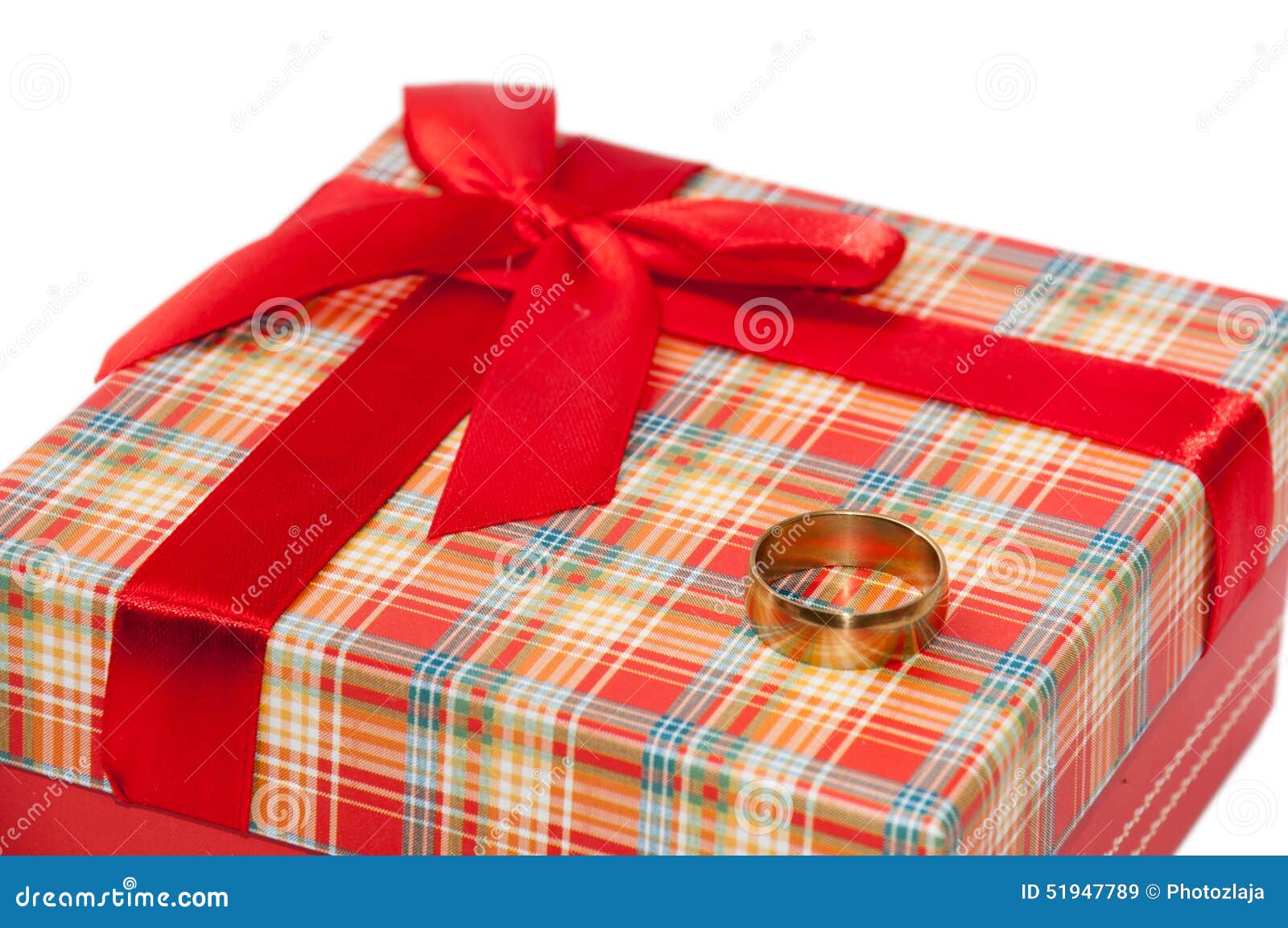 Gold Ring on the Red Box for a Gift with a Bow Stock Image - Image of ...