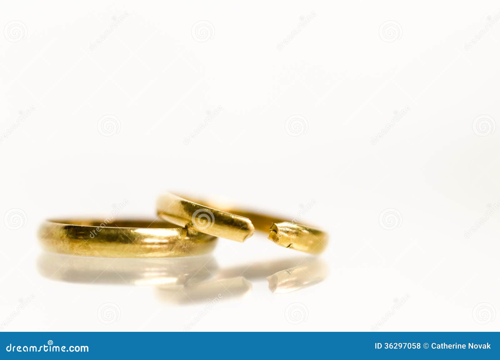 Gold rings broken stock photo. Image of bands, bright - 36297058