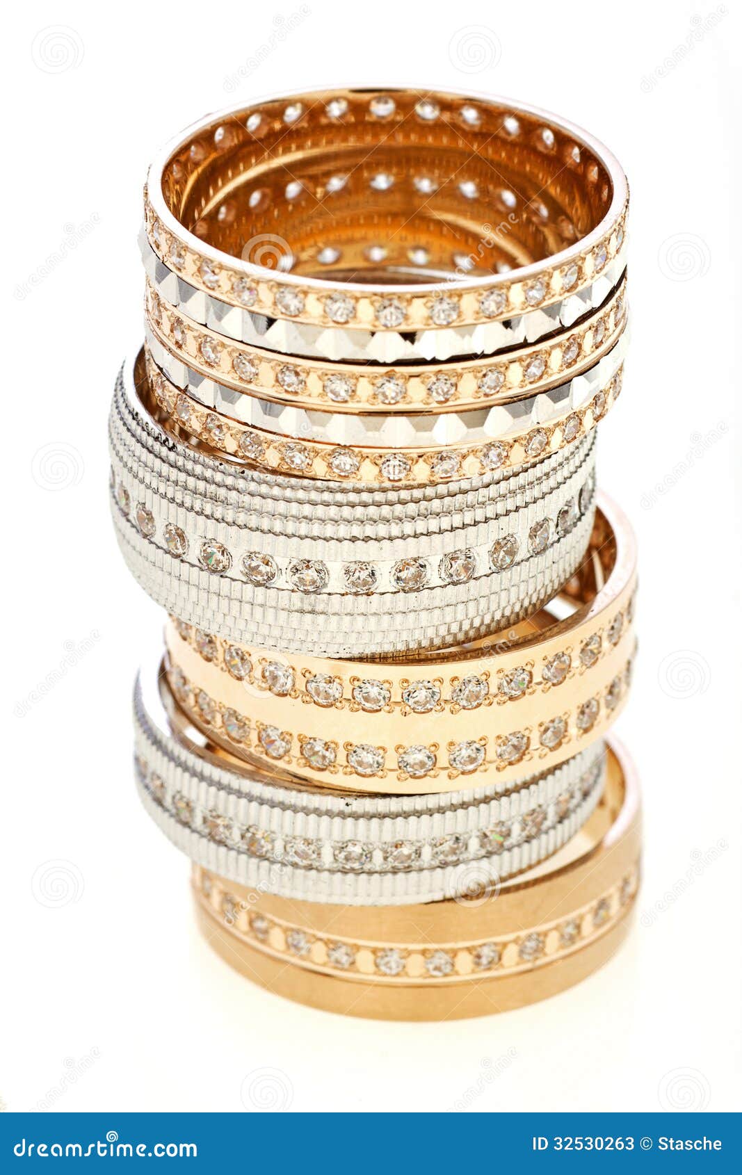 Five gold rings stacked stock image. Image of closeup - 32530263