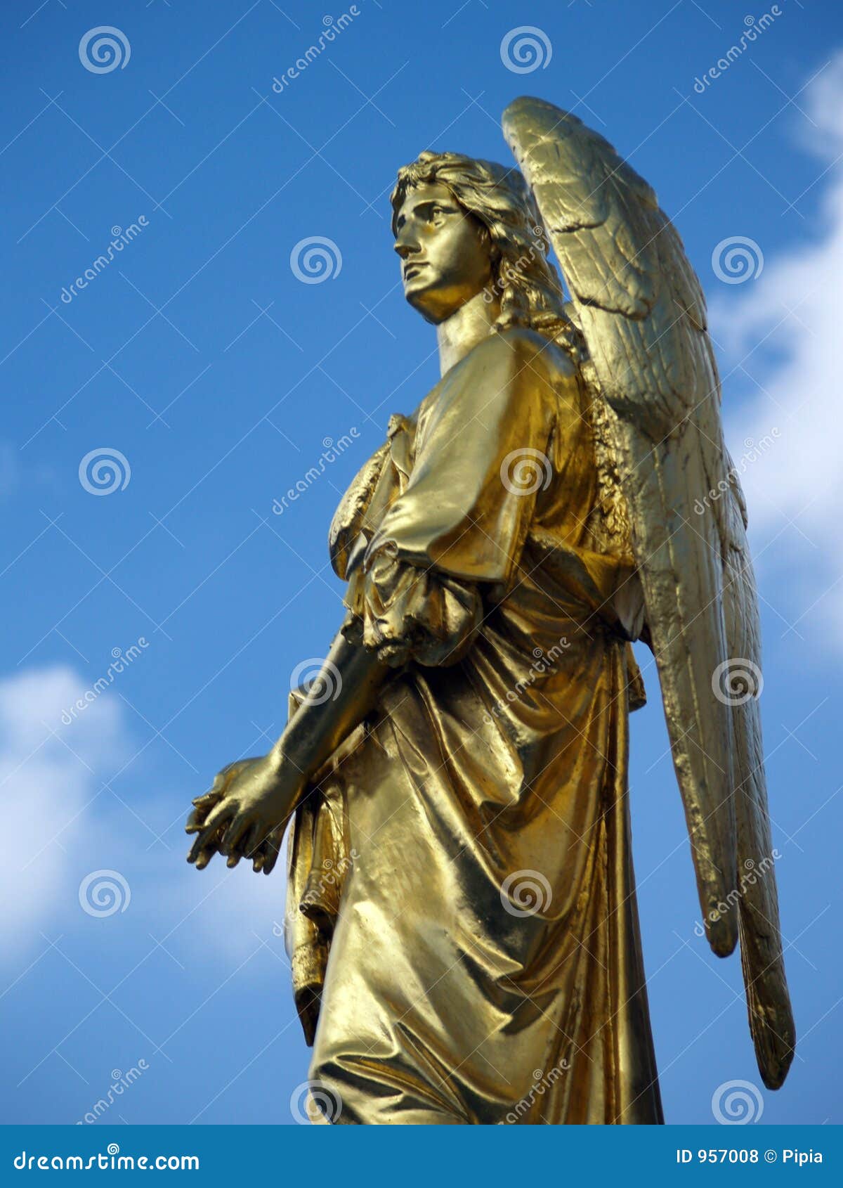 Gold sculpture of an angel stock photo. Image of statue - 957008
