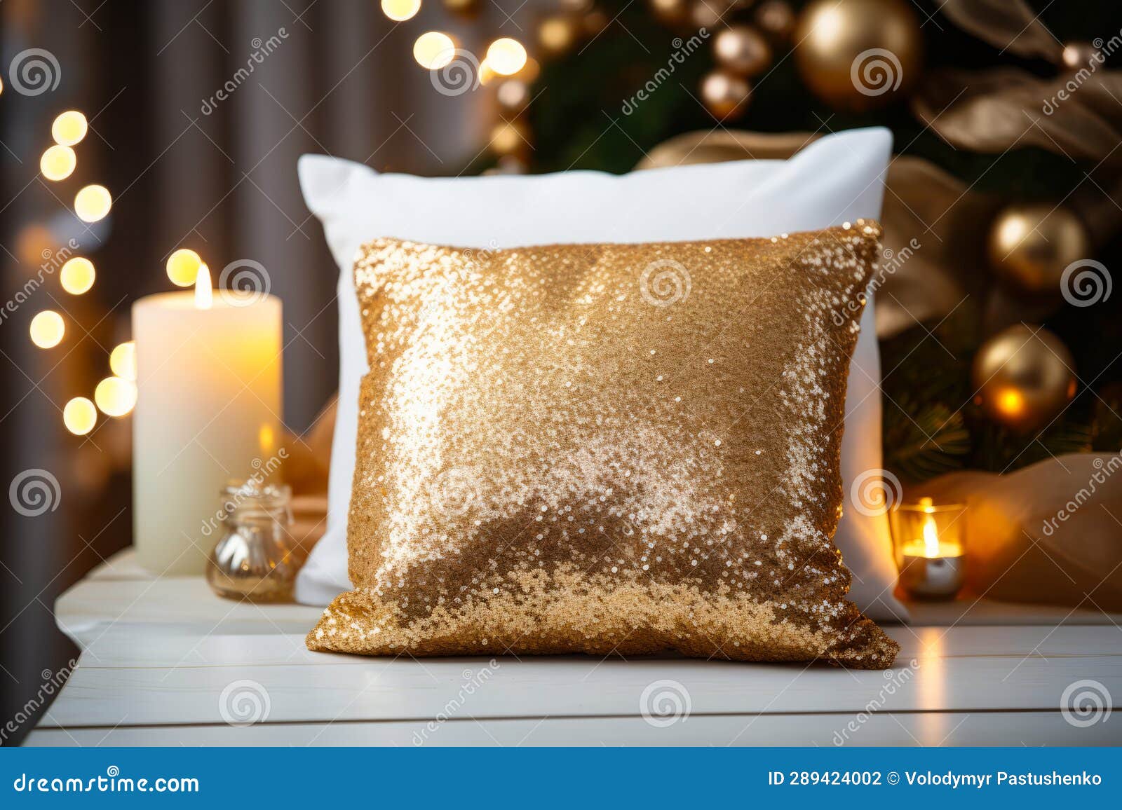 Gold Sequin Pillow Sitting on White Table Next To Lit Candle ...