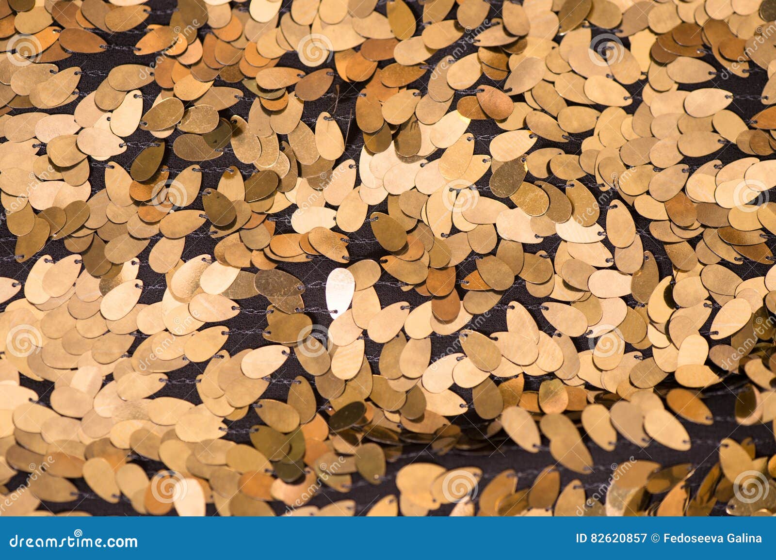 Gold Sequins Sewn Onto the Fabric in the Disco Style. Stock Image ...