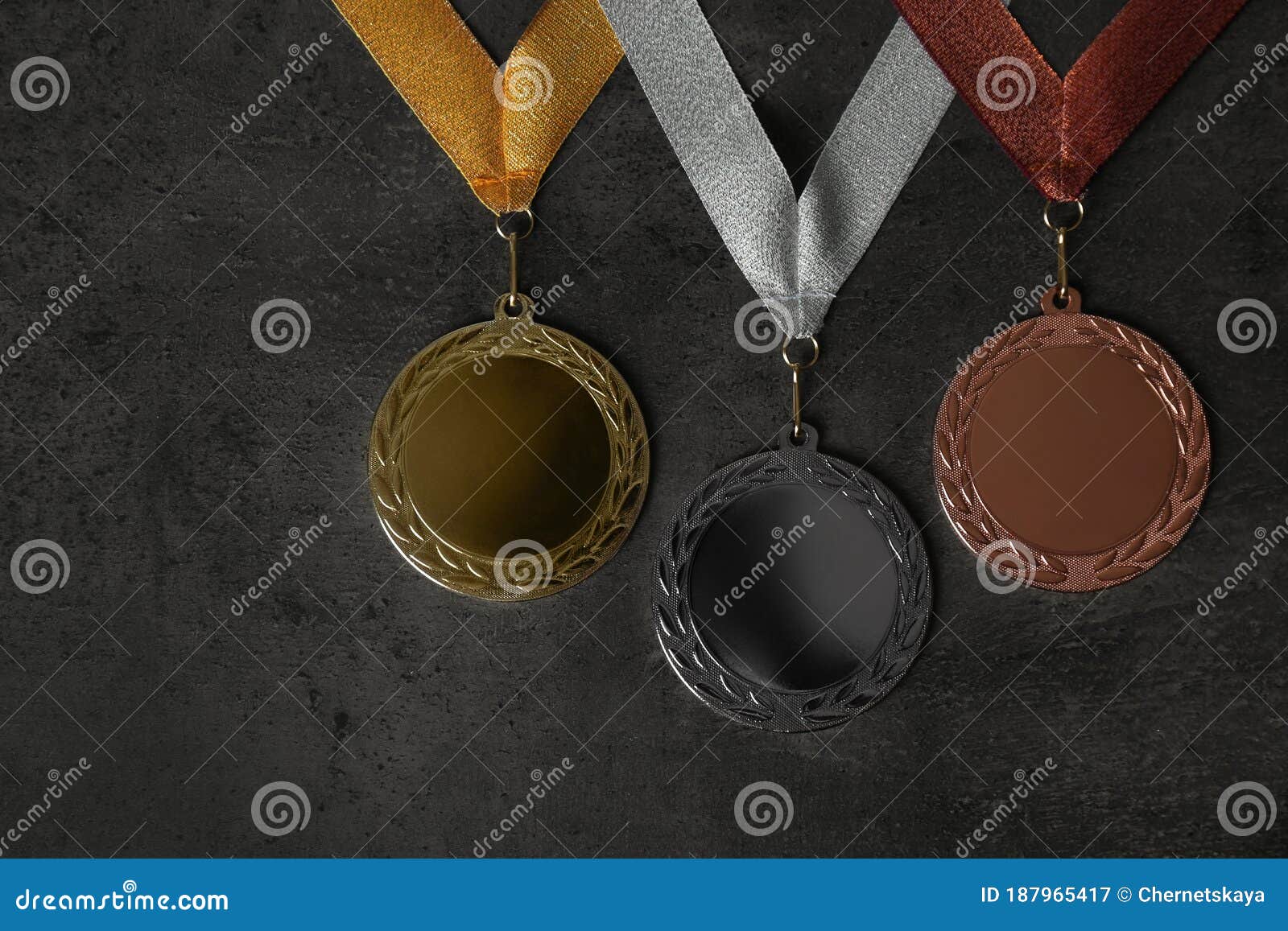 Gold, Silver and Bronze Medals on Stone Background, Flat Lay. Space for ...
