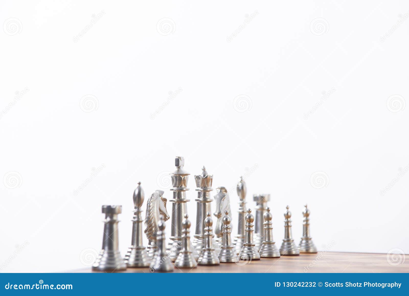 Gold and silver chess set stock photo. Image of alone - 130242232