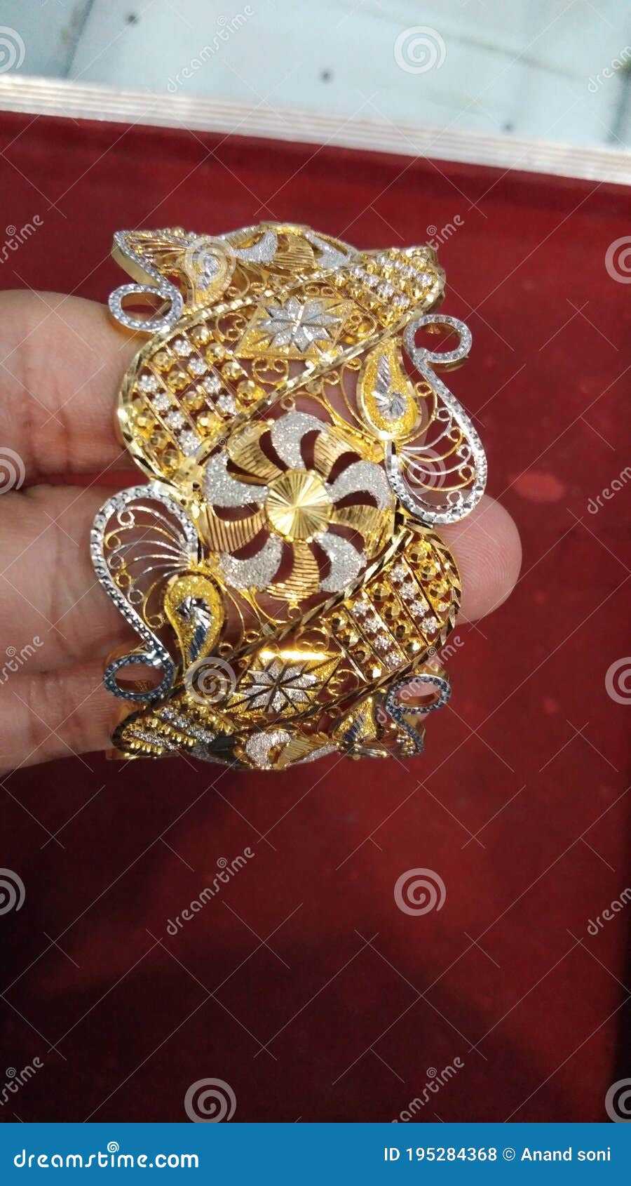 Gold Single Hand Bangle with Rodium Finish on it Stock Photo - Image of ...