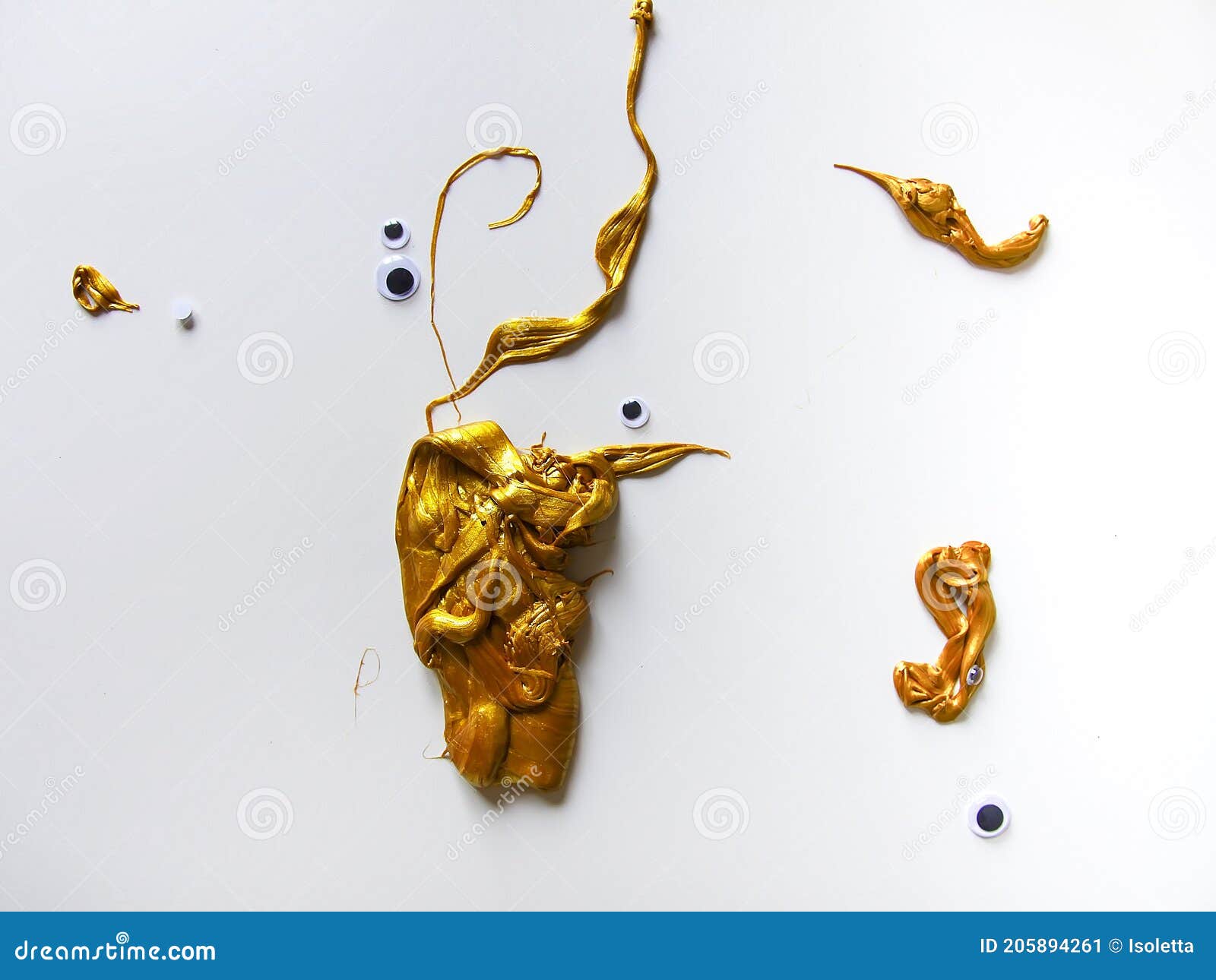 Gold Slime Mass and Handmade Details on White Background Stock Image ...