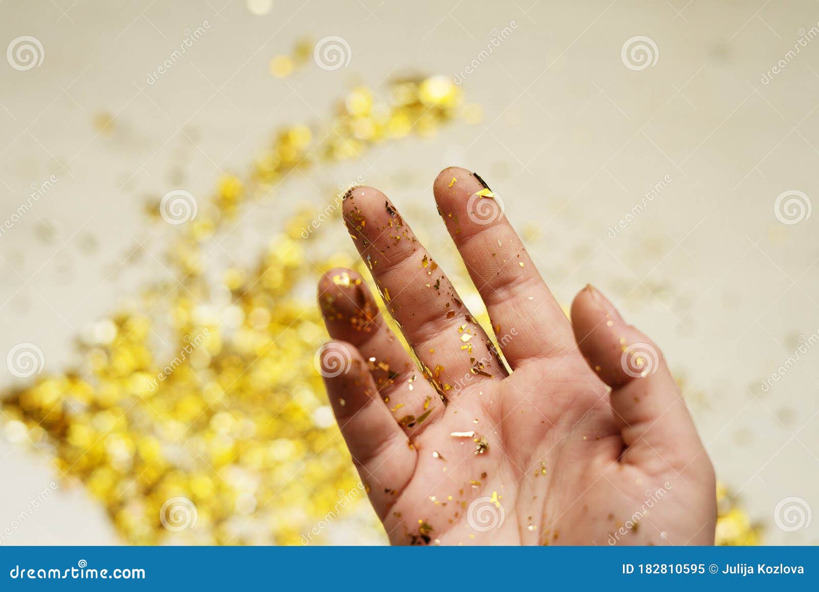 Gold Sparkles in the Palm of Your Hand Stock Image - Image of gold ...