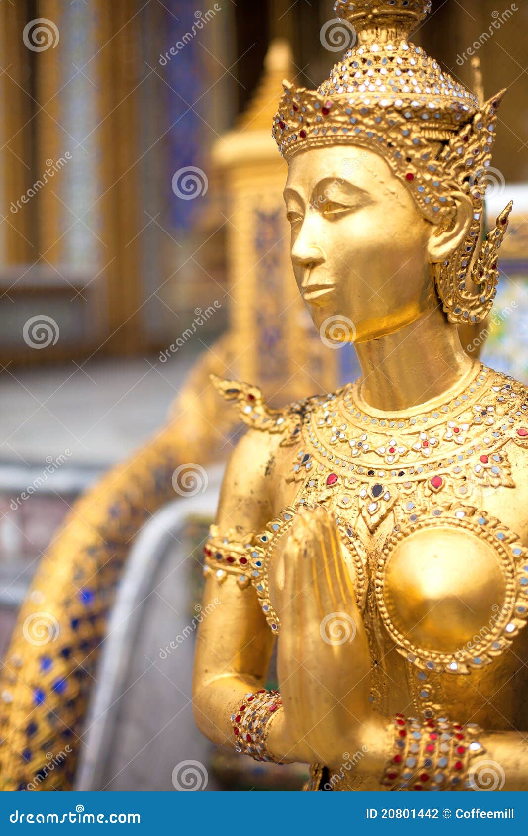 Gold statue in a temple stock photo. Image of statue - 20801442