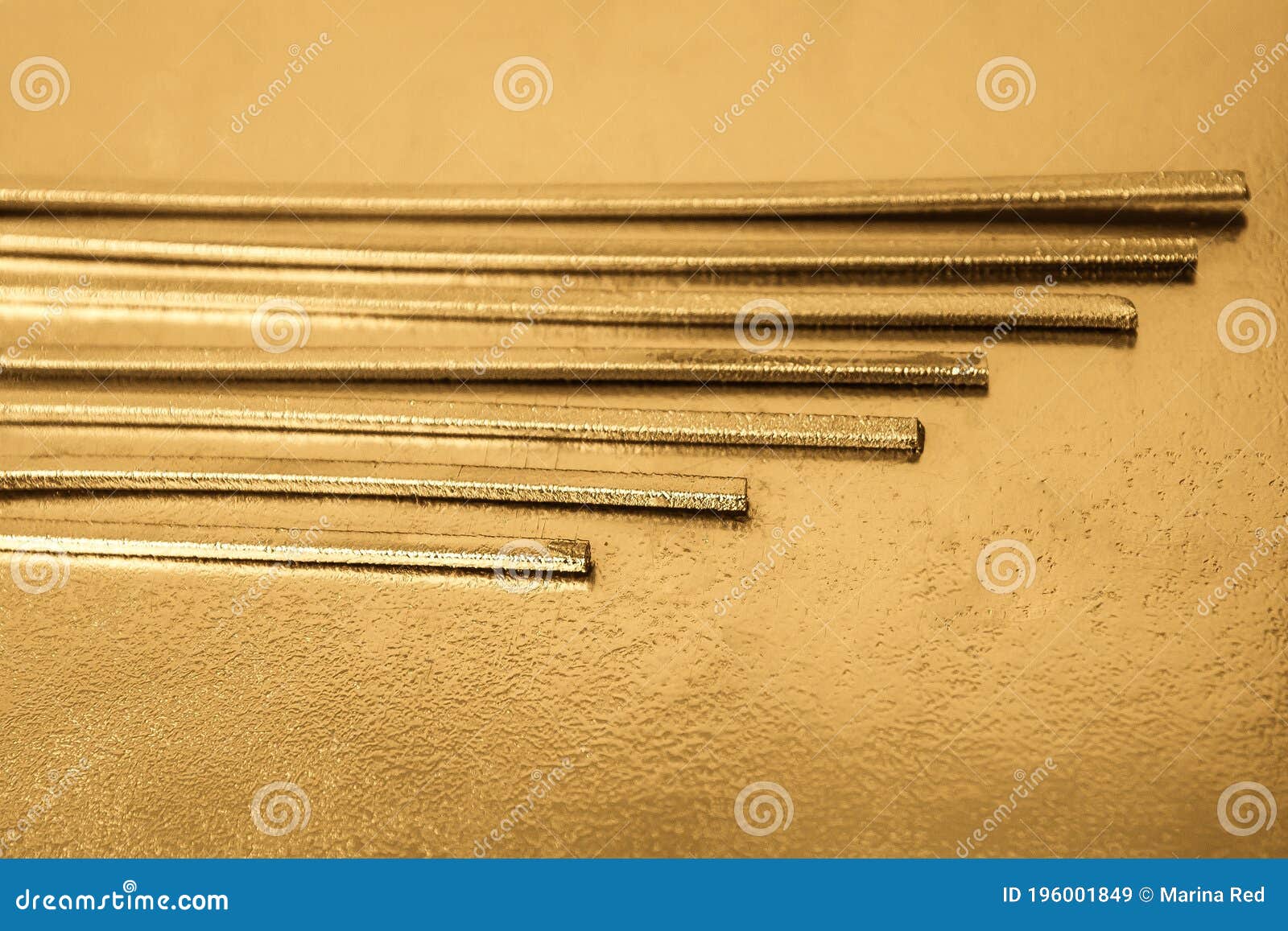 Gold Sticks on a Gold Background. Stock Image - Image of fineness ...