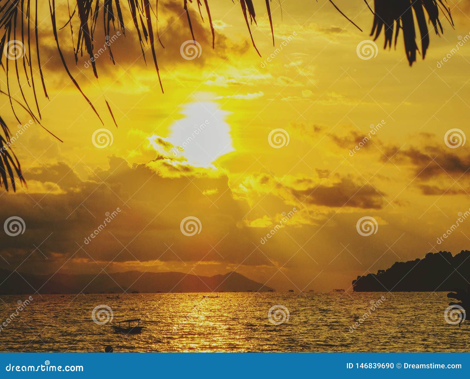 Gold sun set stock photo. Image of ocean, gold, beach - 146839690