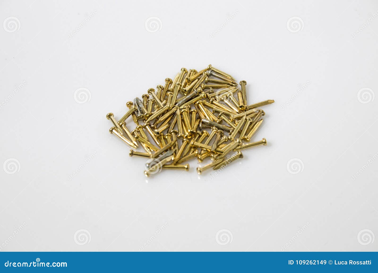 Gold Tacks in a White Background Stock Image - Image of background ...