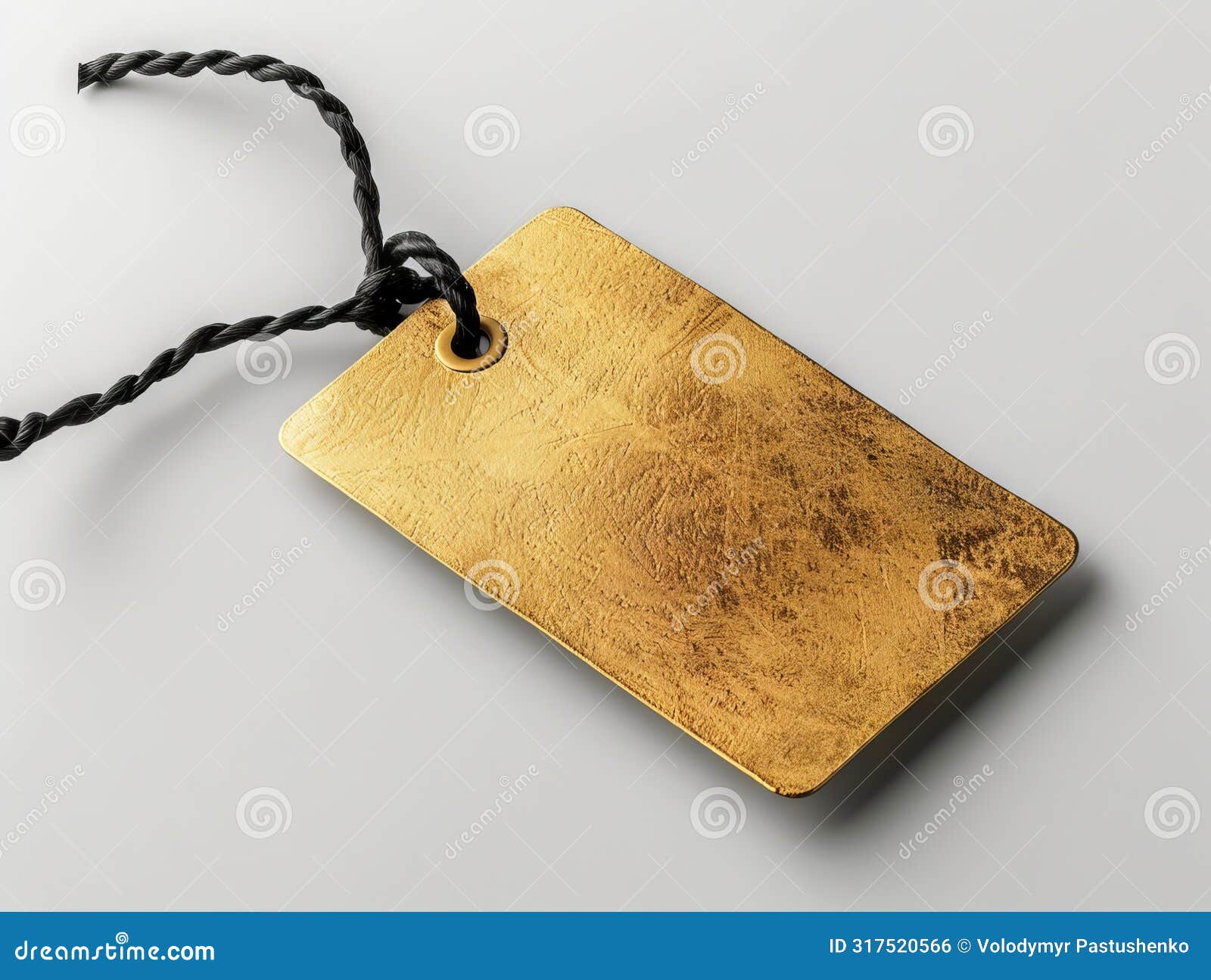 A Gold Tag with a Rope on it Stock Photo - Image of string, pendant ...