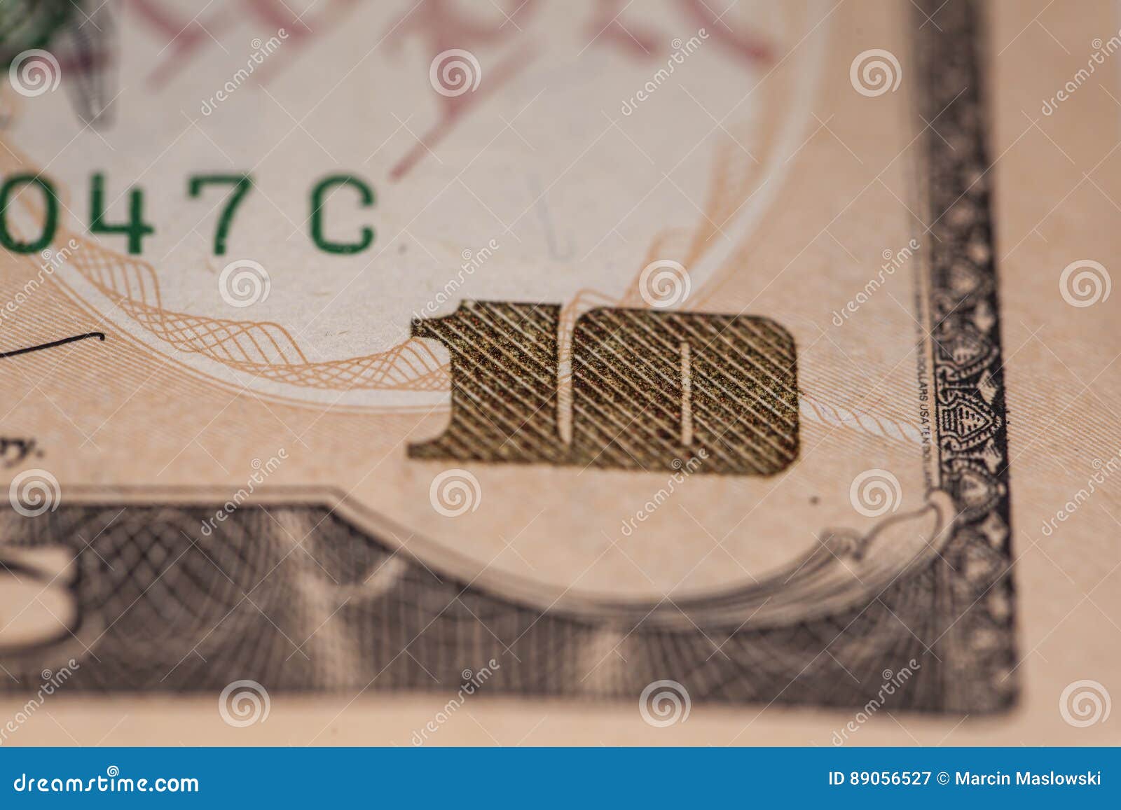 Gold ten on the banknote stock image. Image of abundance - 89056527