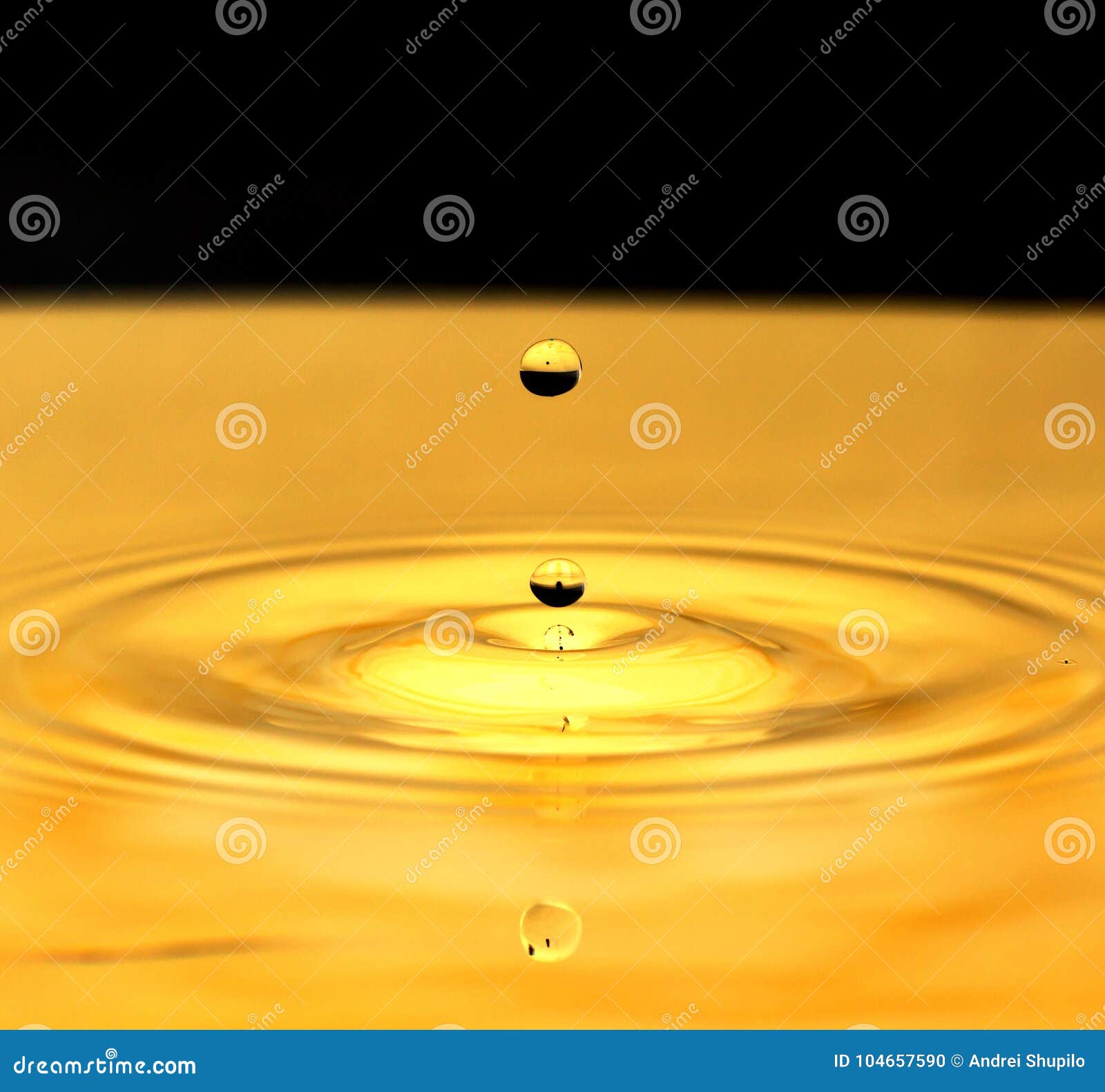 Gold water drop stock photo. Image of background, orange - 104657590