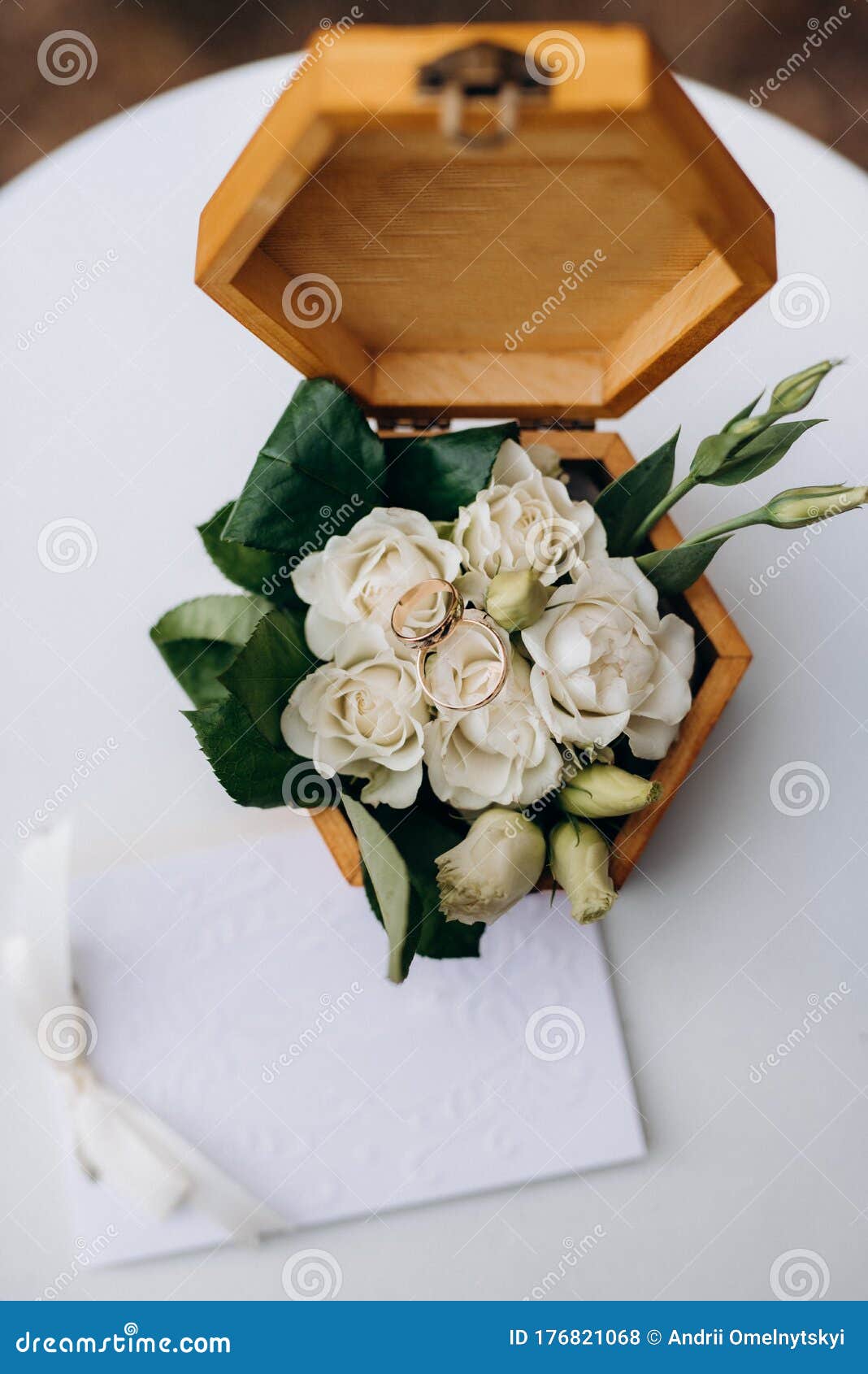 Gold Wedding Rings with a Wedding Decor Stock Photo - Image of ...