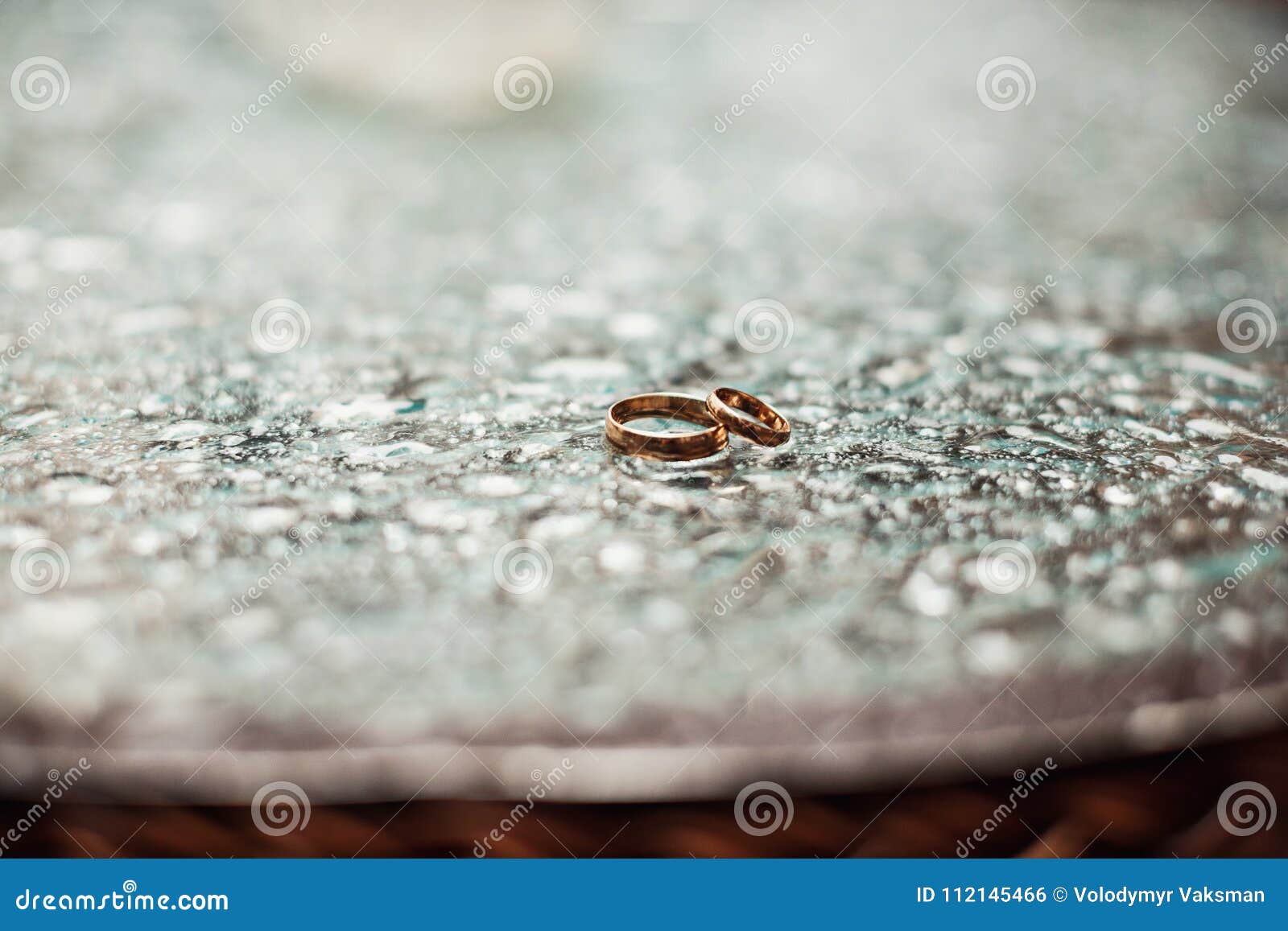 Gold Wedding Rings between Drops Stock Photo - Image of circle, close ...
