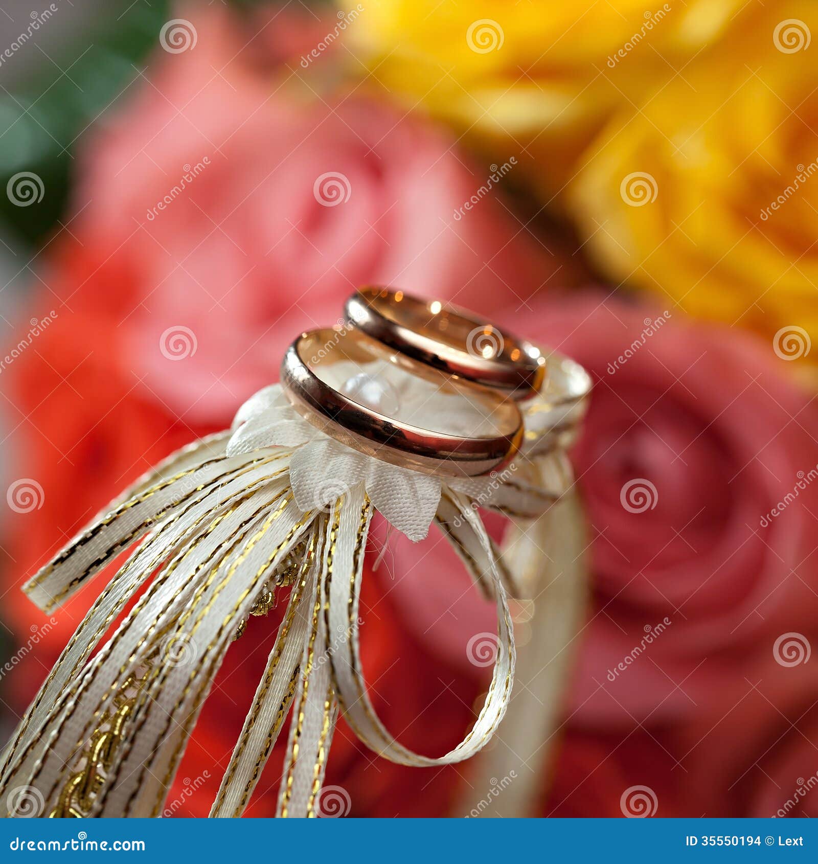 Gold Wedding Rings on Flower . Stock Photo - Image of togetherness ...