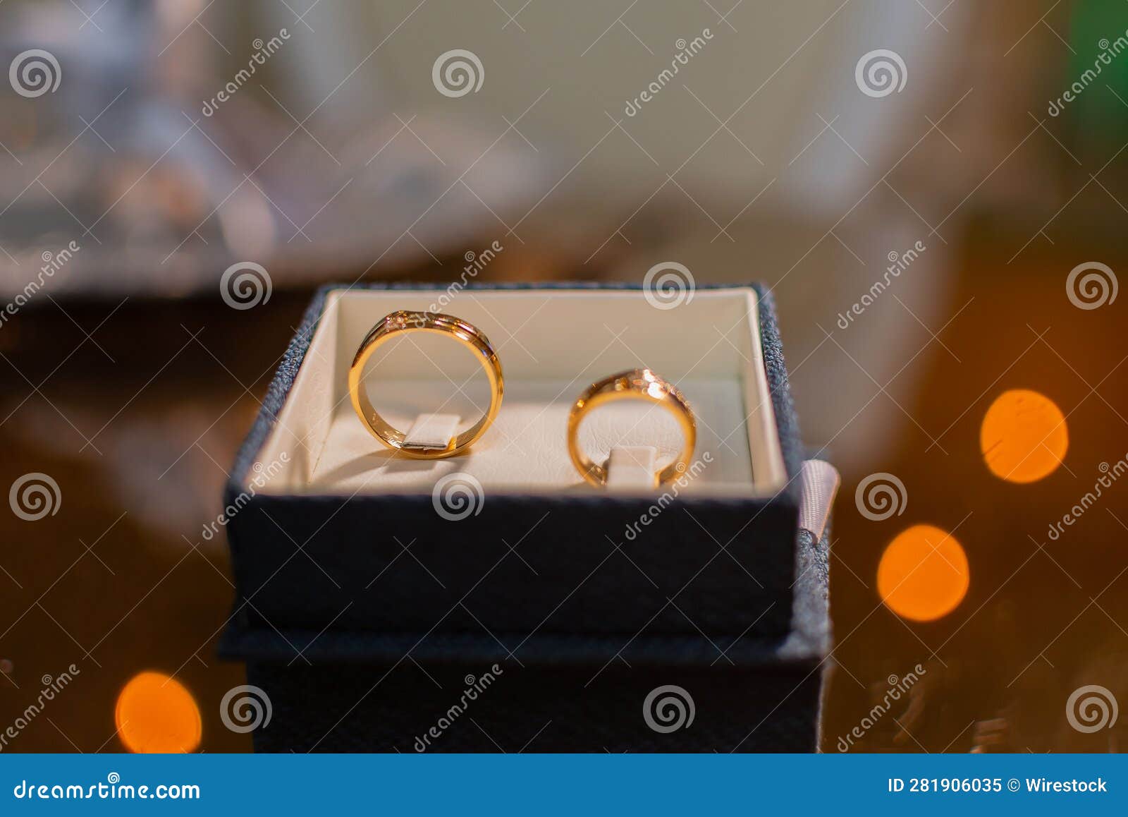 Gold Wedding Rings Illuminated by Soft Light, a Perfect Representation ...