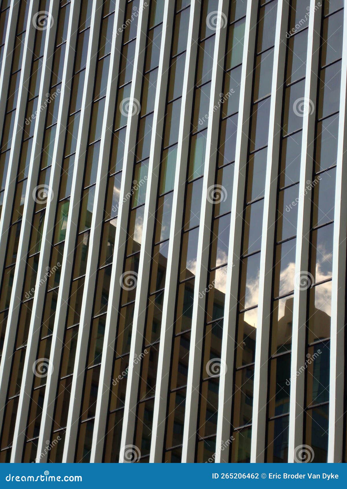 Gold Windows on Side of Office Building Editorial Photography - Image ...