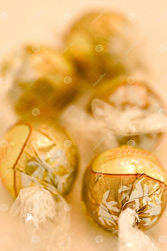 Gold wrap chocolate candy stock image. Image of confectionary - 65805