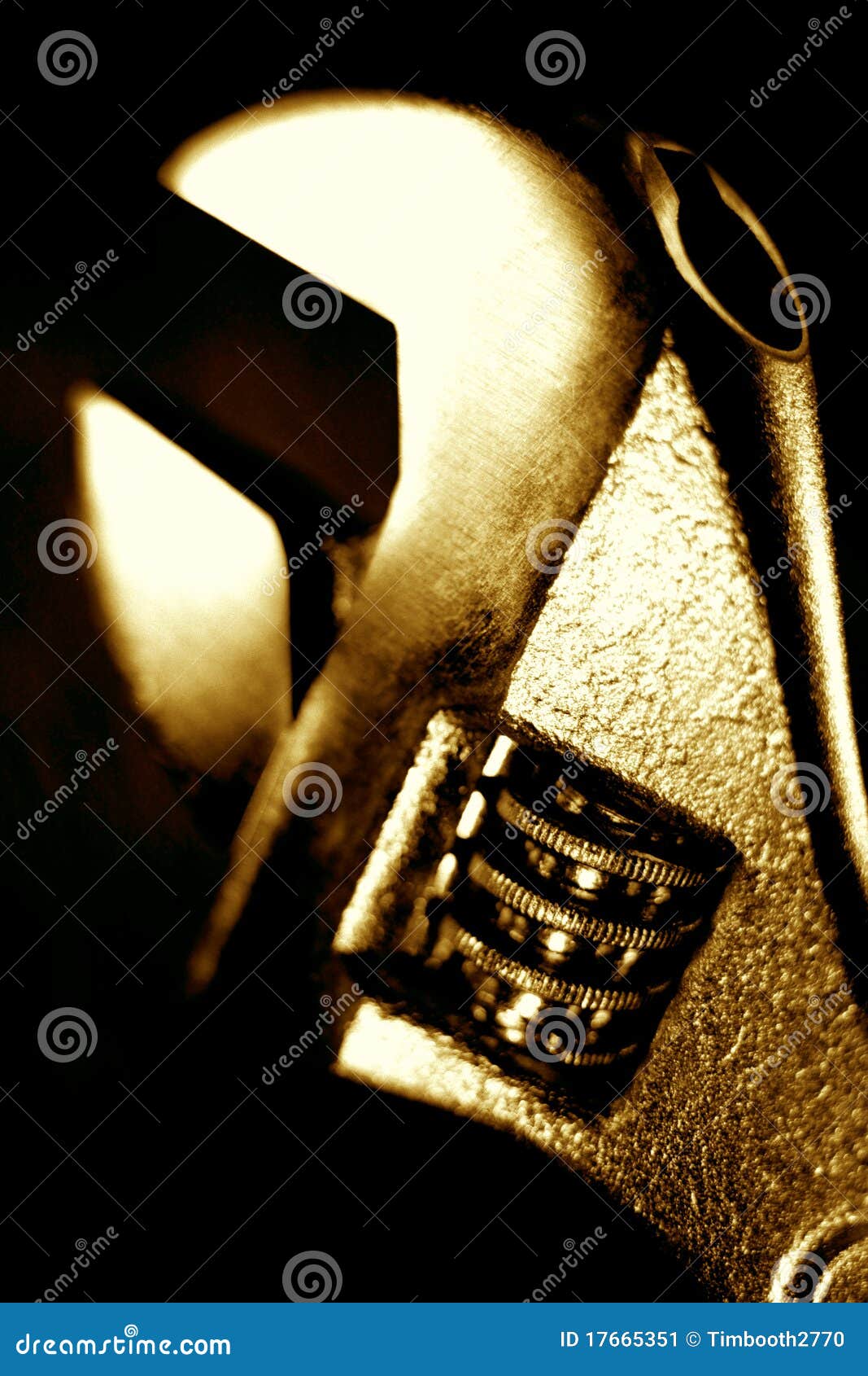 Golden adjustable spanner stock image. Image of single - 17665351