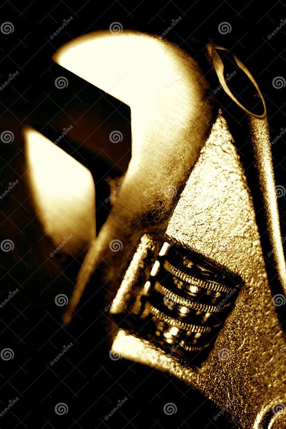 Golden adjustable spanner stock image. Image of single - 17665351