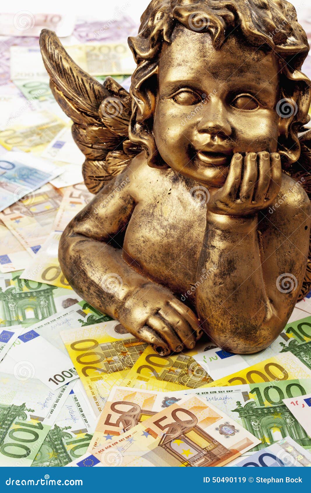 Golden Angel Sculpture on Heap of Euro Notes Stock Image - Image of ...