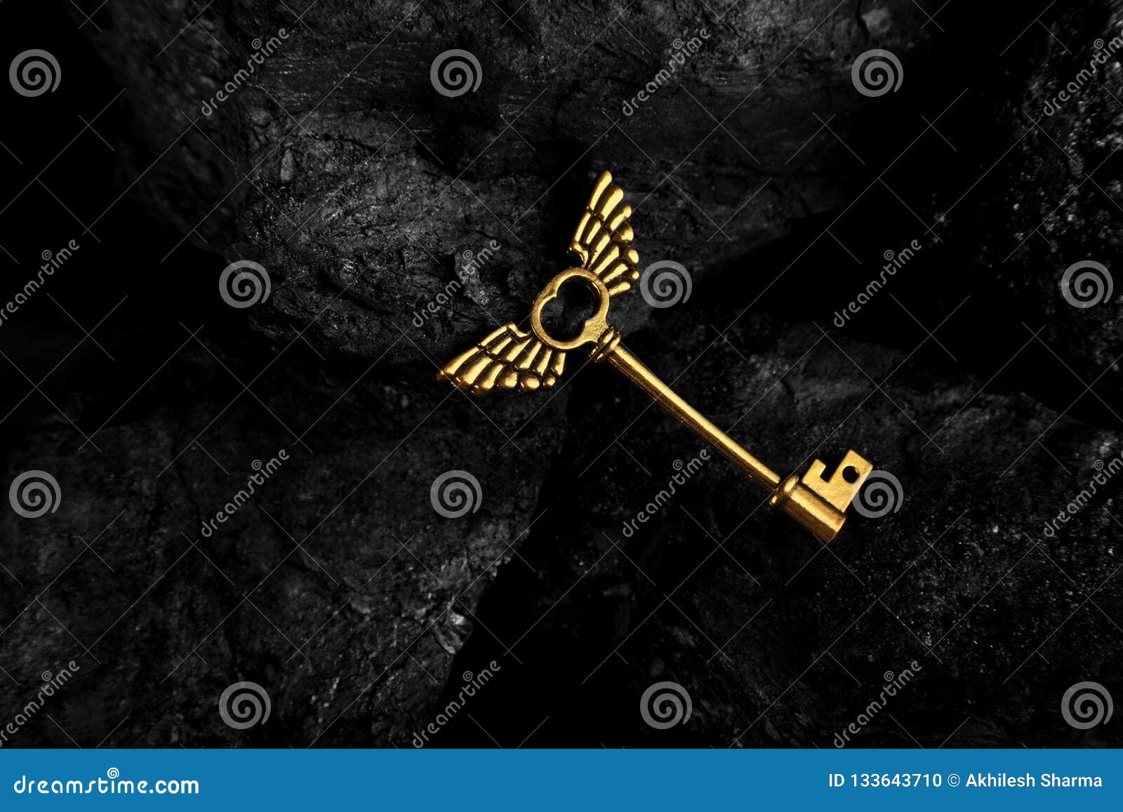 Golden Antique Key with Wings on Dark Black Background Stock Photo ... Golden Antique Key with Wings on Dark Black Background Stock Photo ...