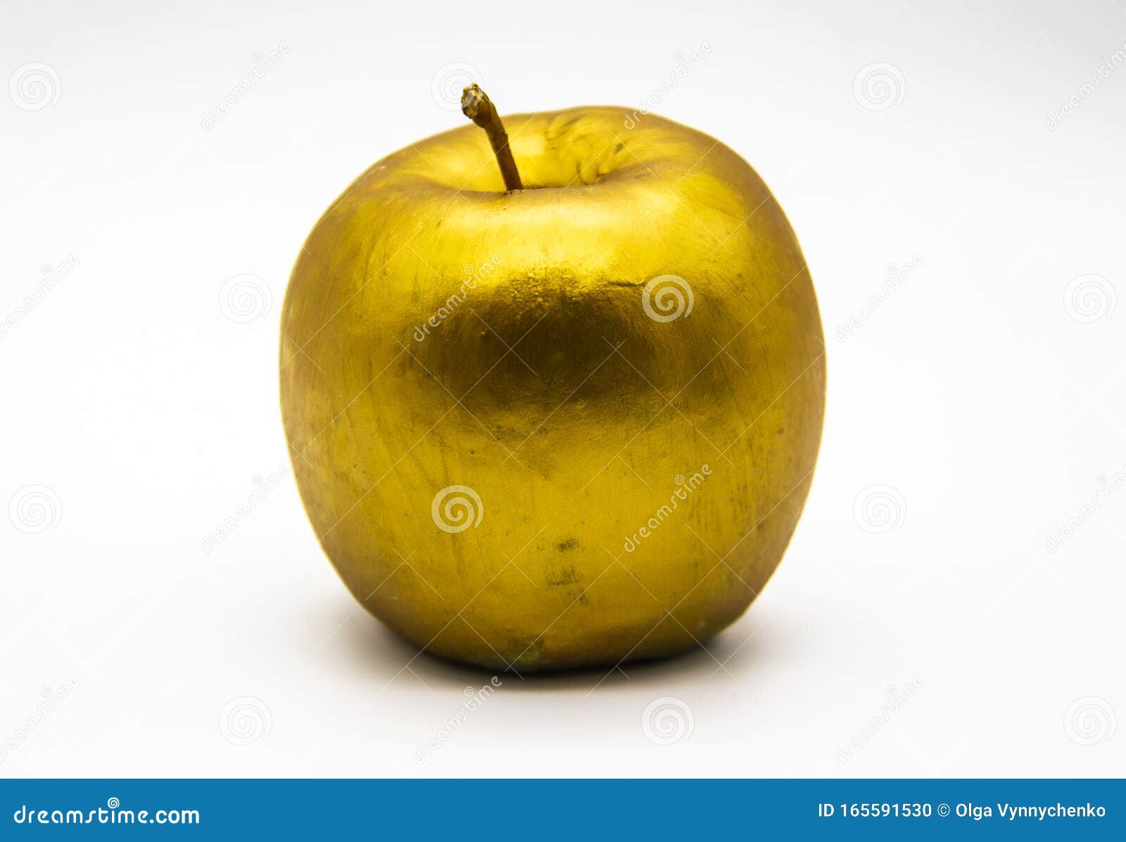 A Golden Apple on a White Background. Concept in Design. an Apple Stock ...