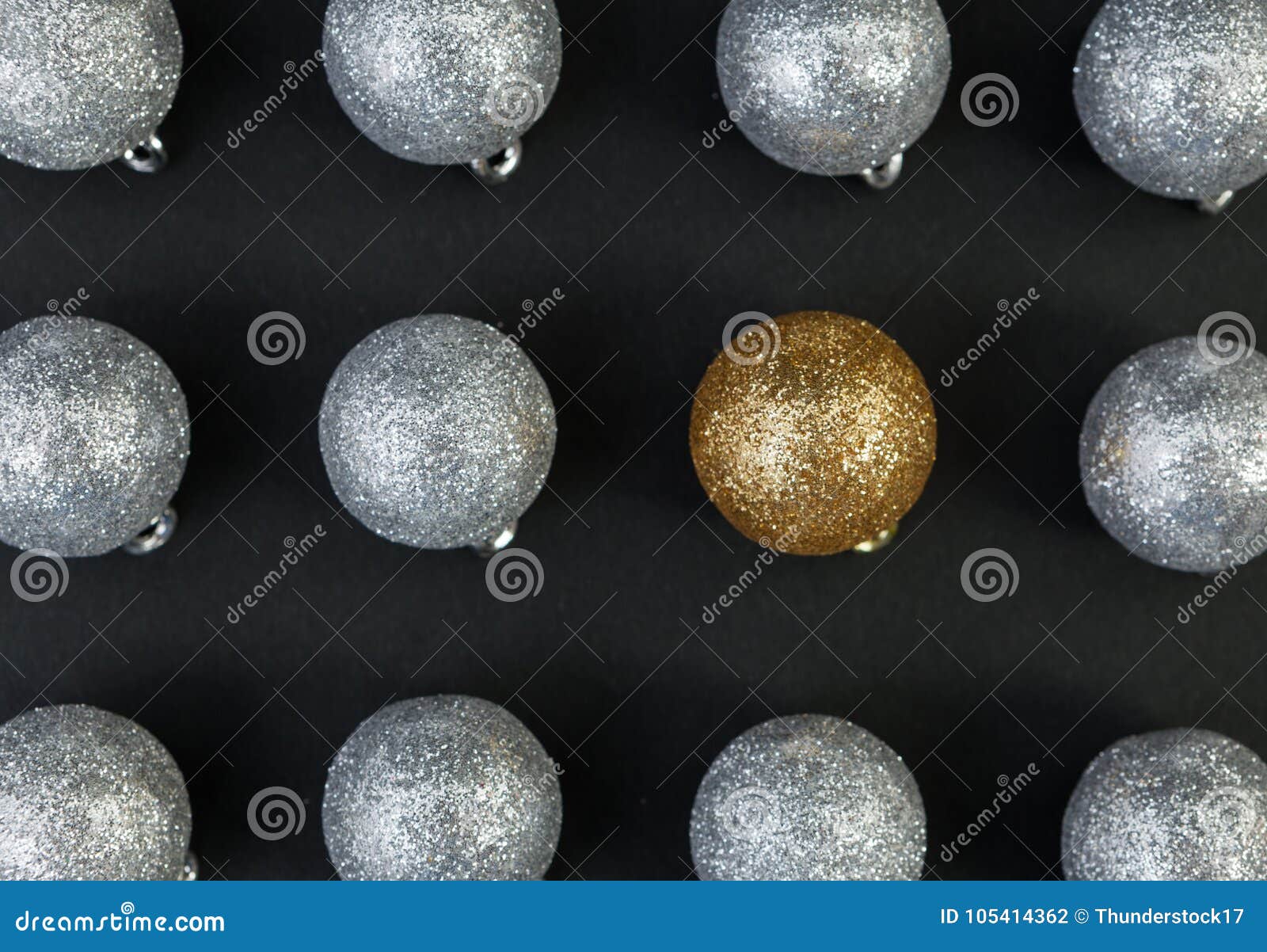 Golden Ball in the Middle of Silver Balls Pattern Stock Photo - Image ...