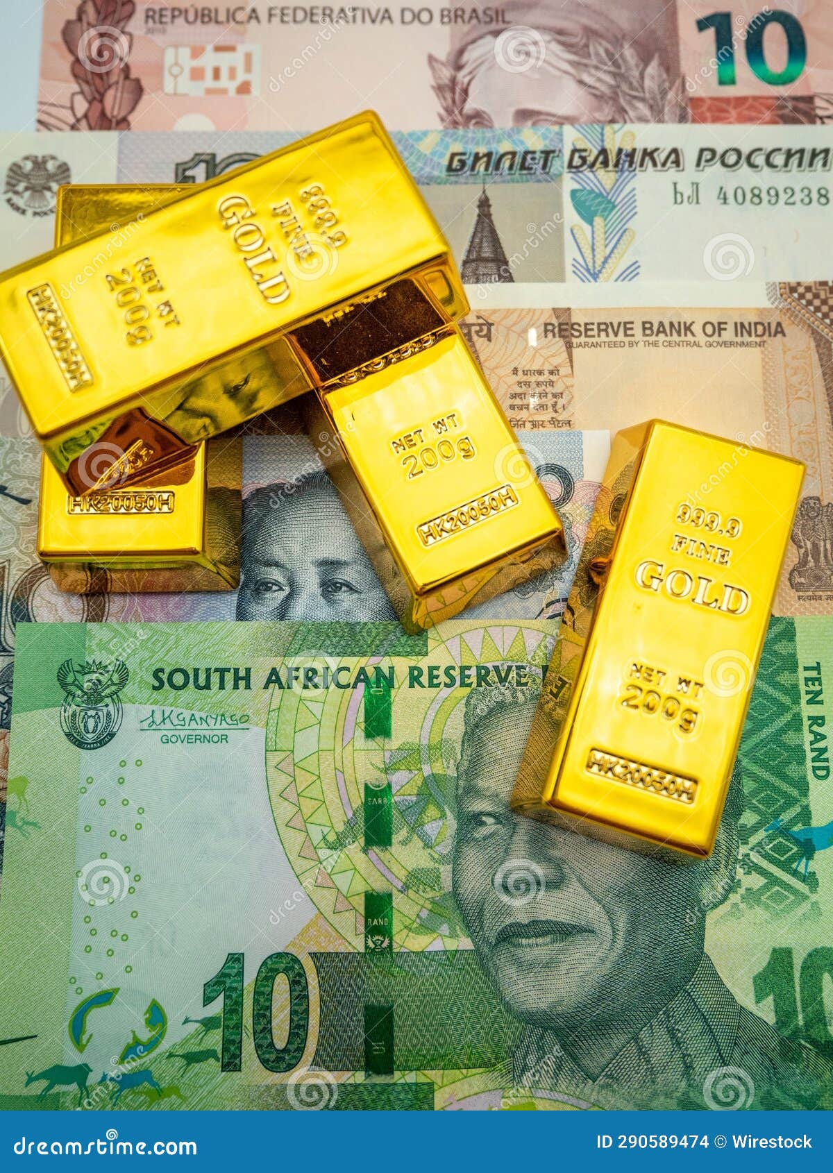 Golden Bars on the Surface with Different Currency Banknotes Stock ...
