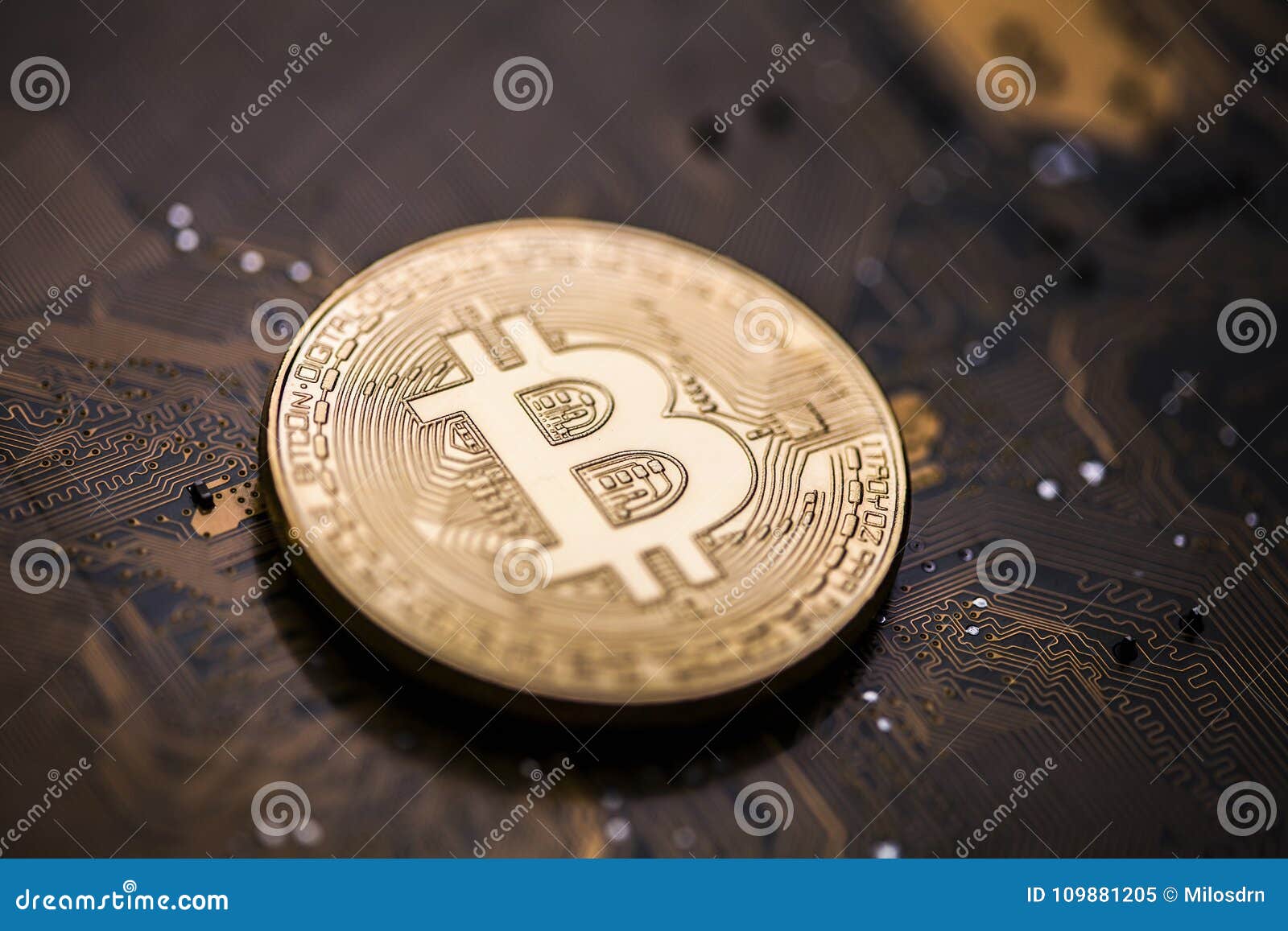 Golden Bitcoin Token on a Computer Interface Motherboard Stock Image ...