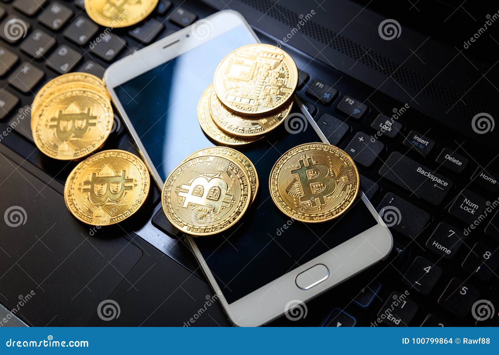 Bitcoins on a smart phone stock photo. Image of cash - 100799864