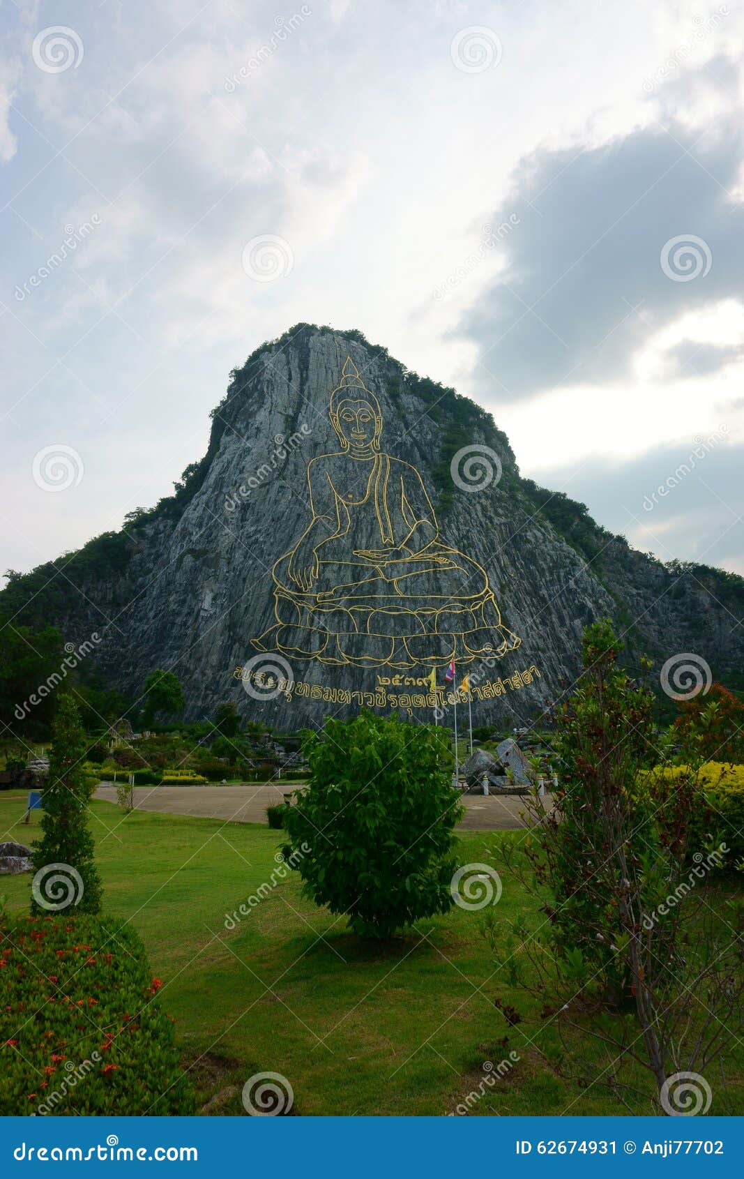 Golden Buddha on the rock editorial photo. Image of national - 62674931