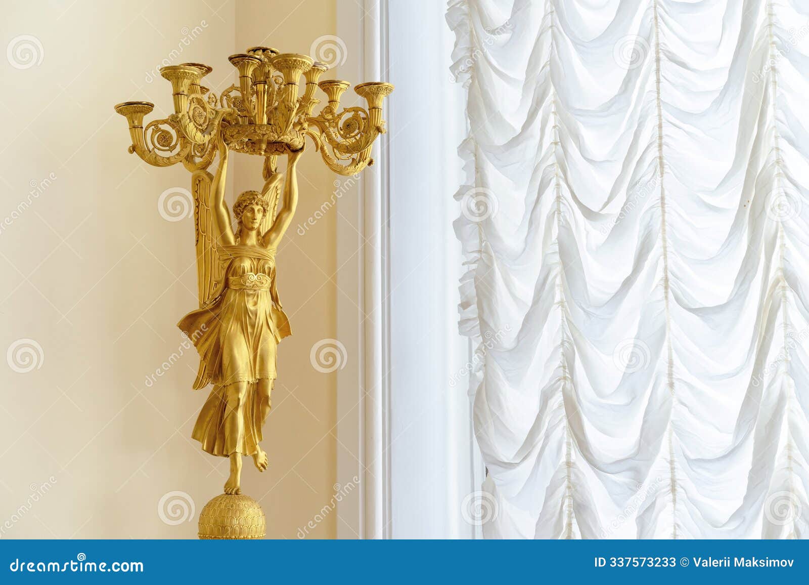 Golden Candlestick in the Shape of an Ancient Greek Goddess. Stock ...