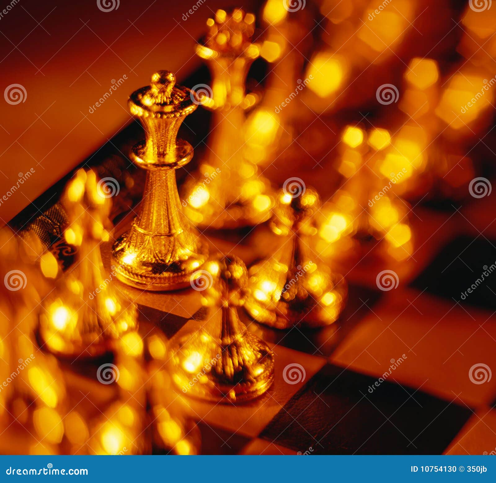 Golden chess pieces stock photo. Image of background - 10754130