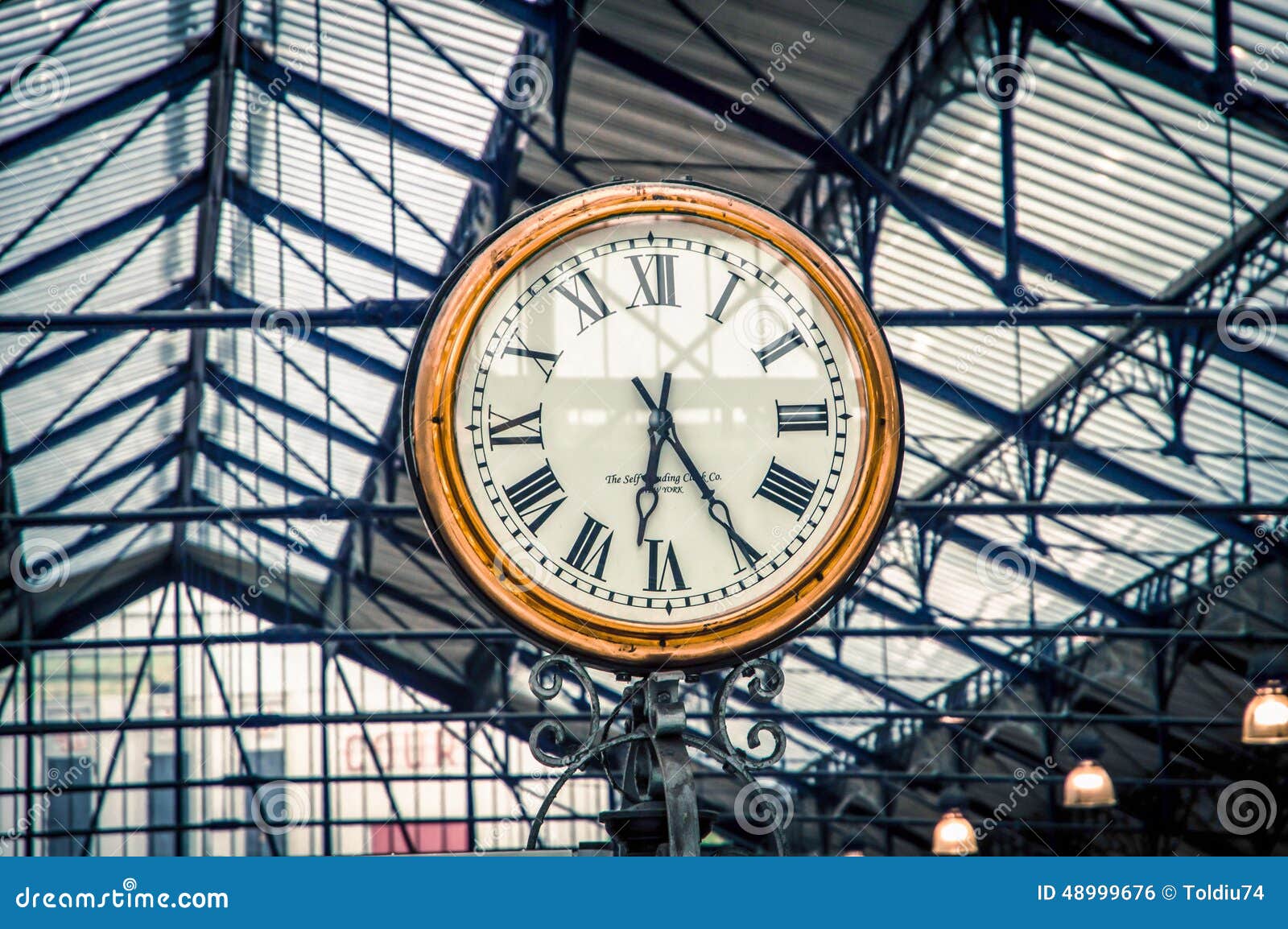 Golden clock editorial photo. Image of standing, train - 48999676