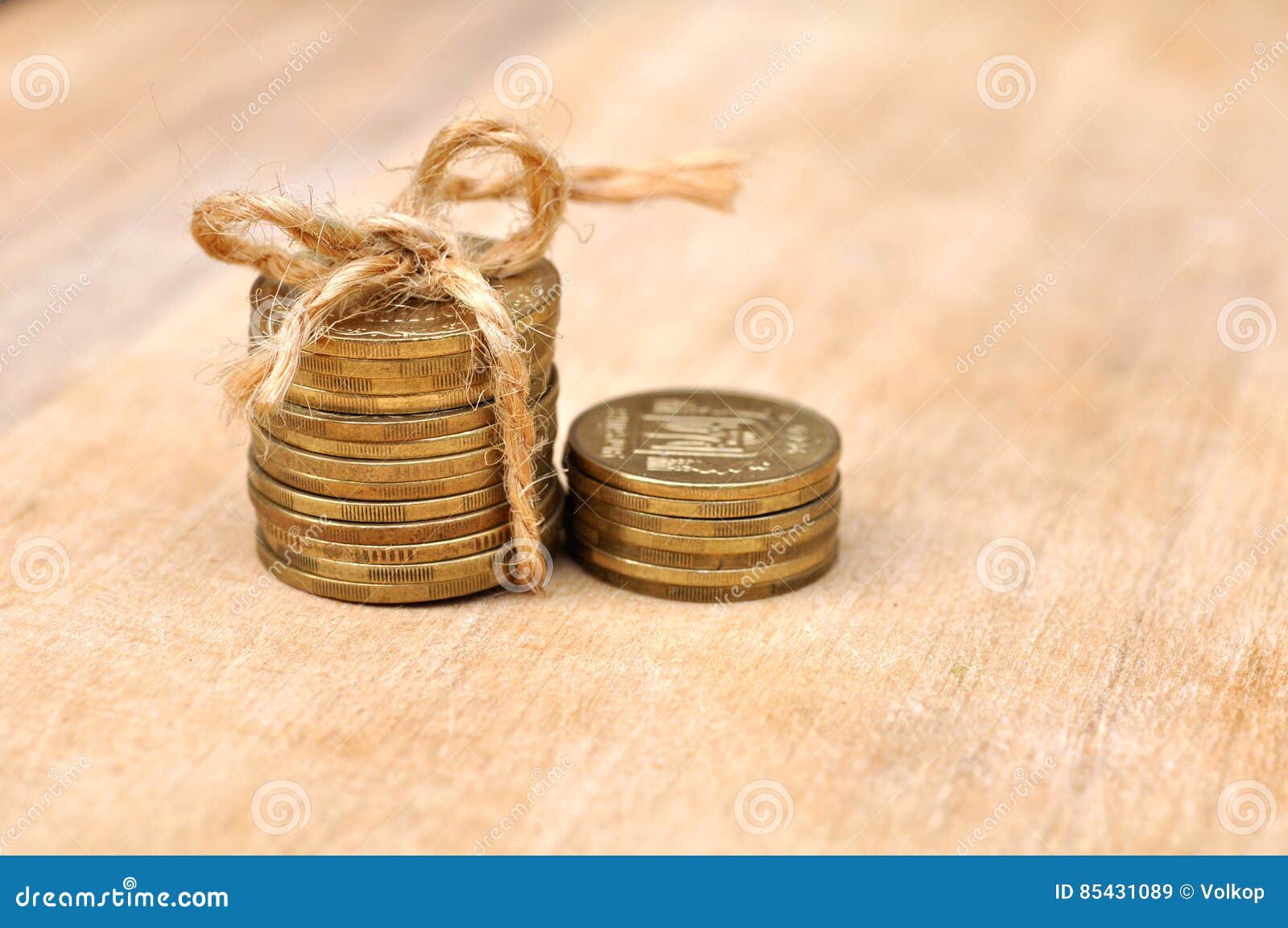 Golden Coins with Rope on Wood Table Stock Image - Image of rich ...