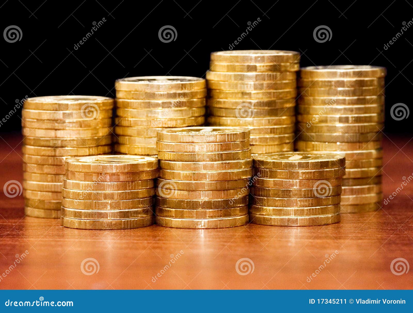 Golden Coins on a Wooden Table Stock Image - Image of euro, glow: 17345211
