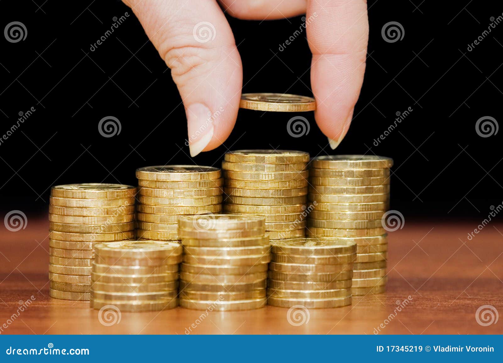 Golden Coins on a Wooden Table Stock Image - Image of cash, doubloon ...