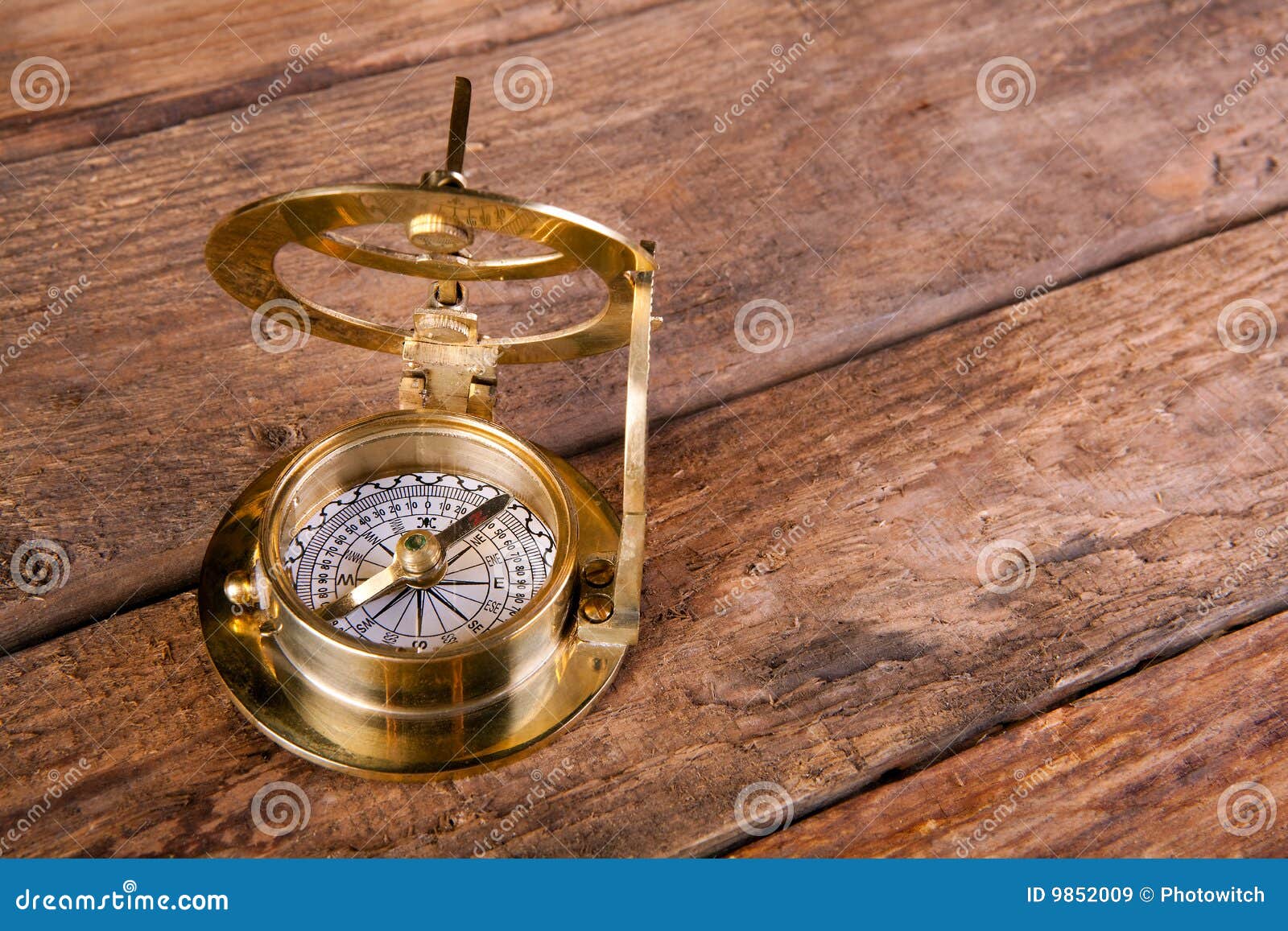 Golden Compass On The Seashore. Focus On Compass Royalty-Free Stock ...