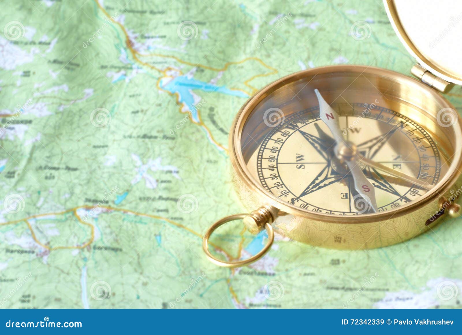 Golden compass on the map stock image. Image of north - 72342339