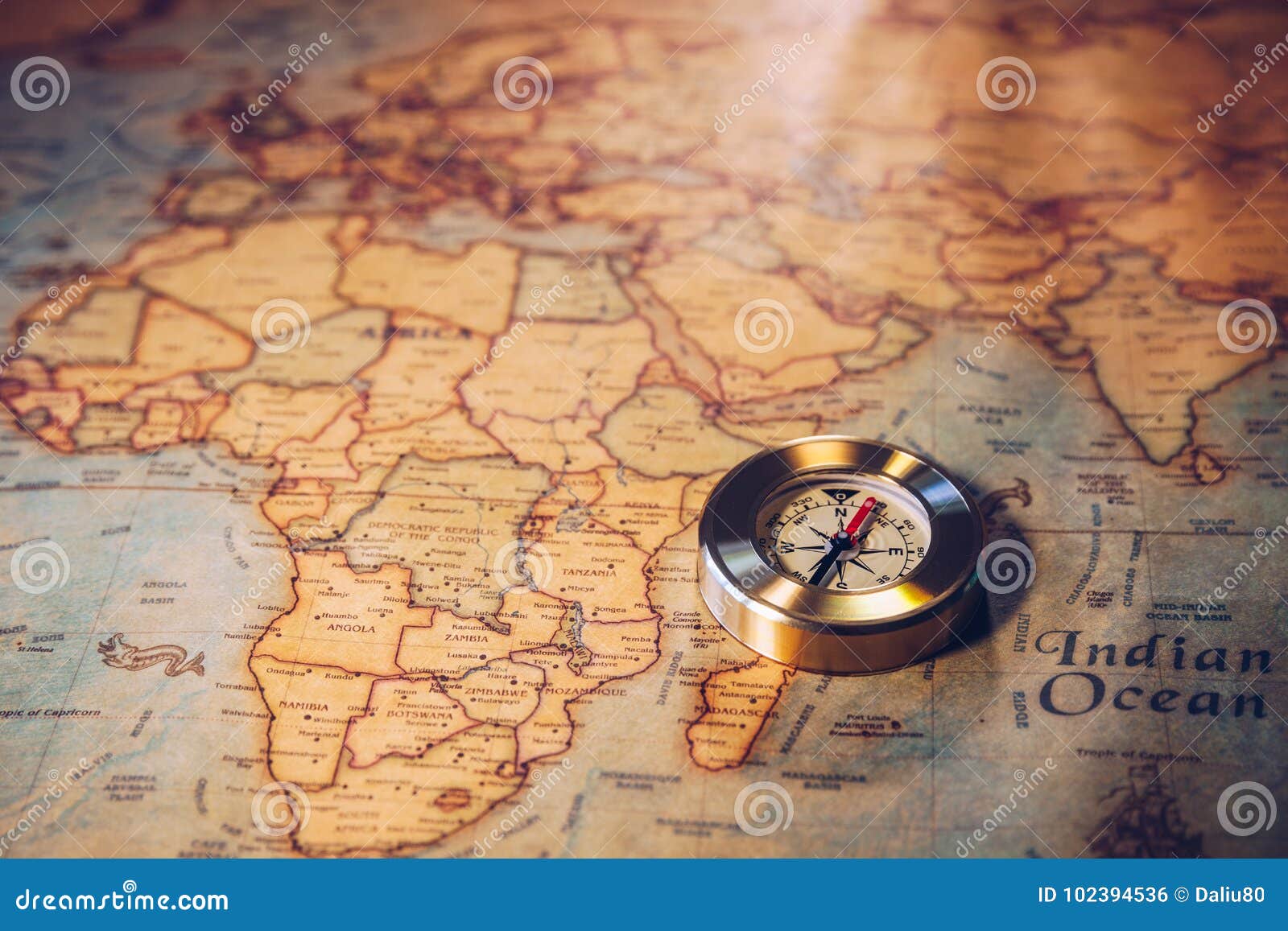 Golden Compass and the Map. Travel and Navigation Theme Stock Photo ...