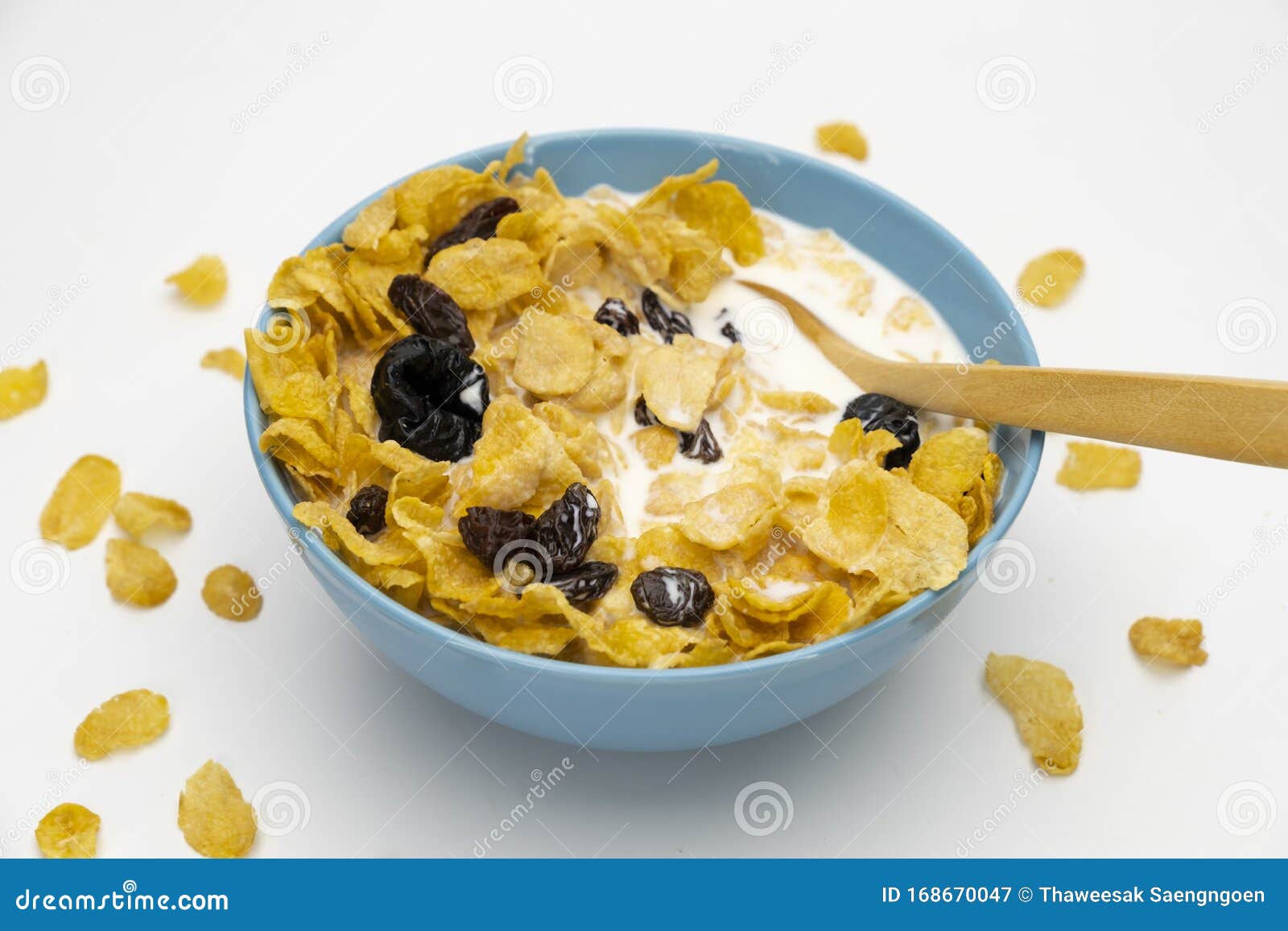 Golden Cornflakes in the Blue Bowl Ready for Adding Fresh Milk for ...