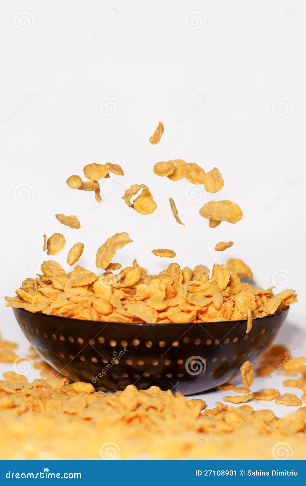 Golden Cornflakes Falling in a Bowl - Isolated Stock Image - Image of ...