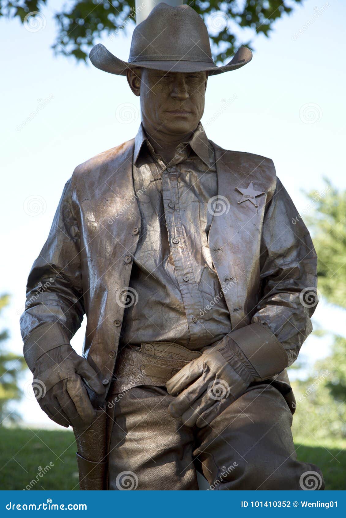 A golden cowboy with gun editorial photography. Image of uniform ...
