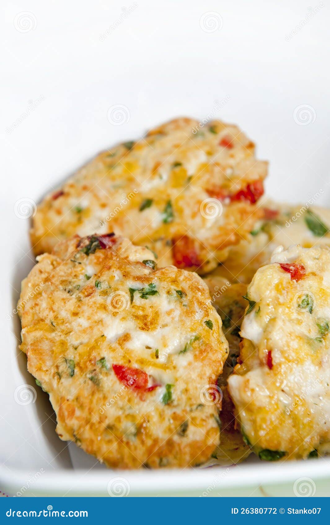 Golden cutlets in a bowl stock photo. Image of crude - 26380772