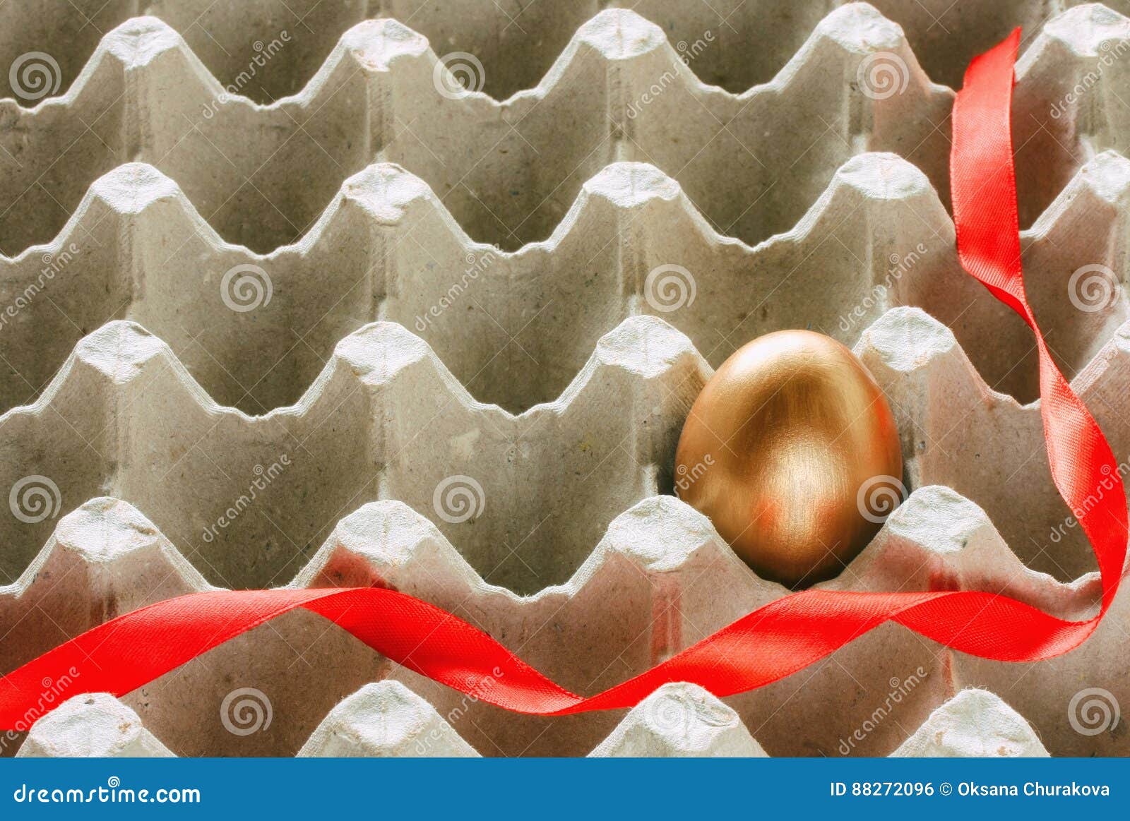 Golden Easter Egg with Red Silk Ribbon Stock Photo - Image of eggs ...