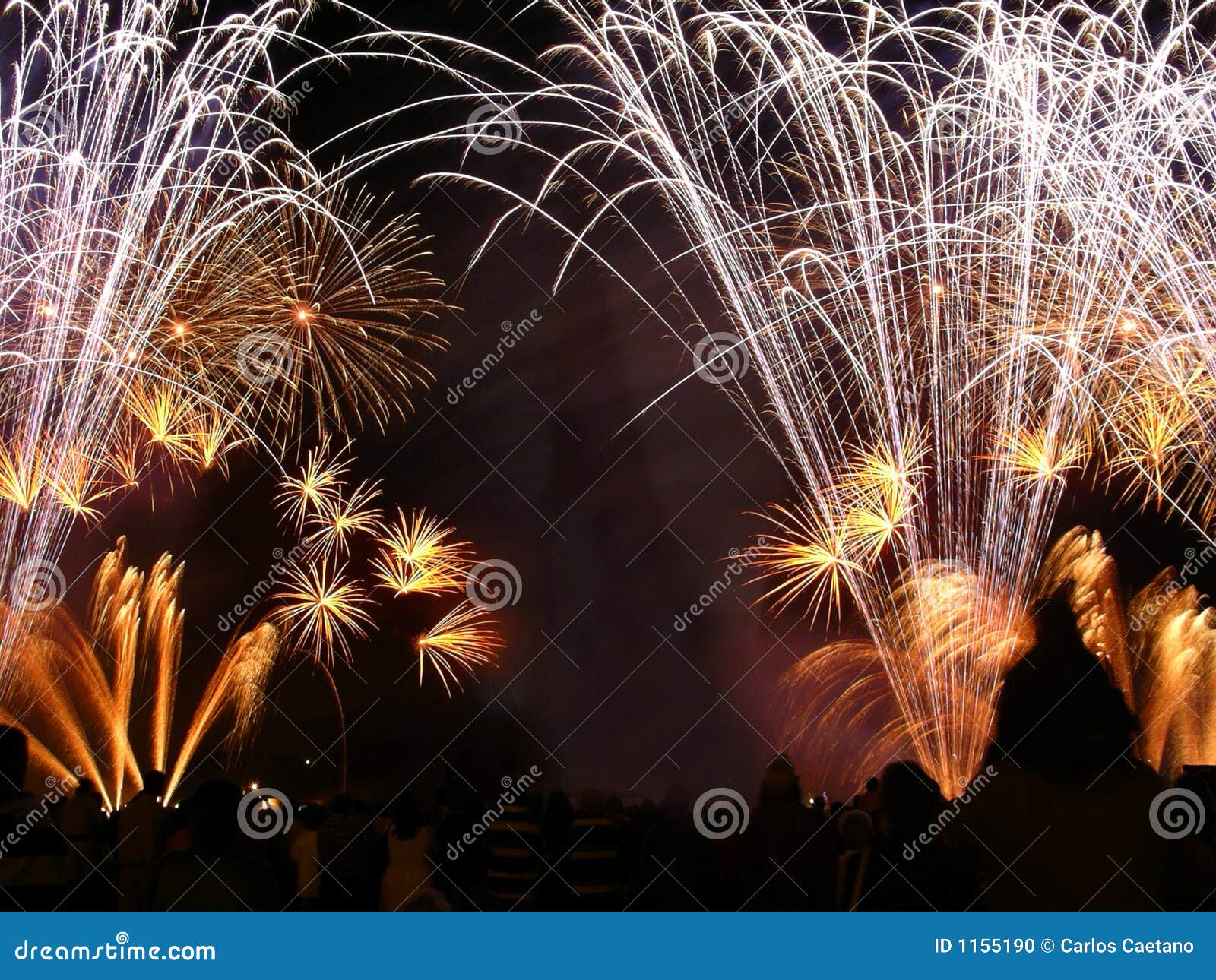 Golden Fireworks stock photo. Image of loud, silhouettes - 1155190